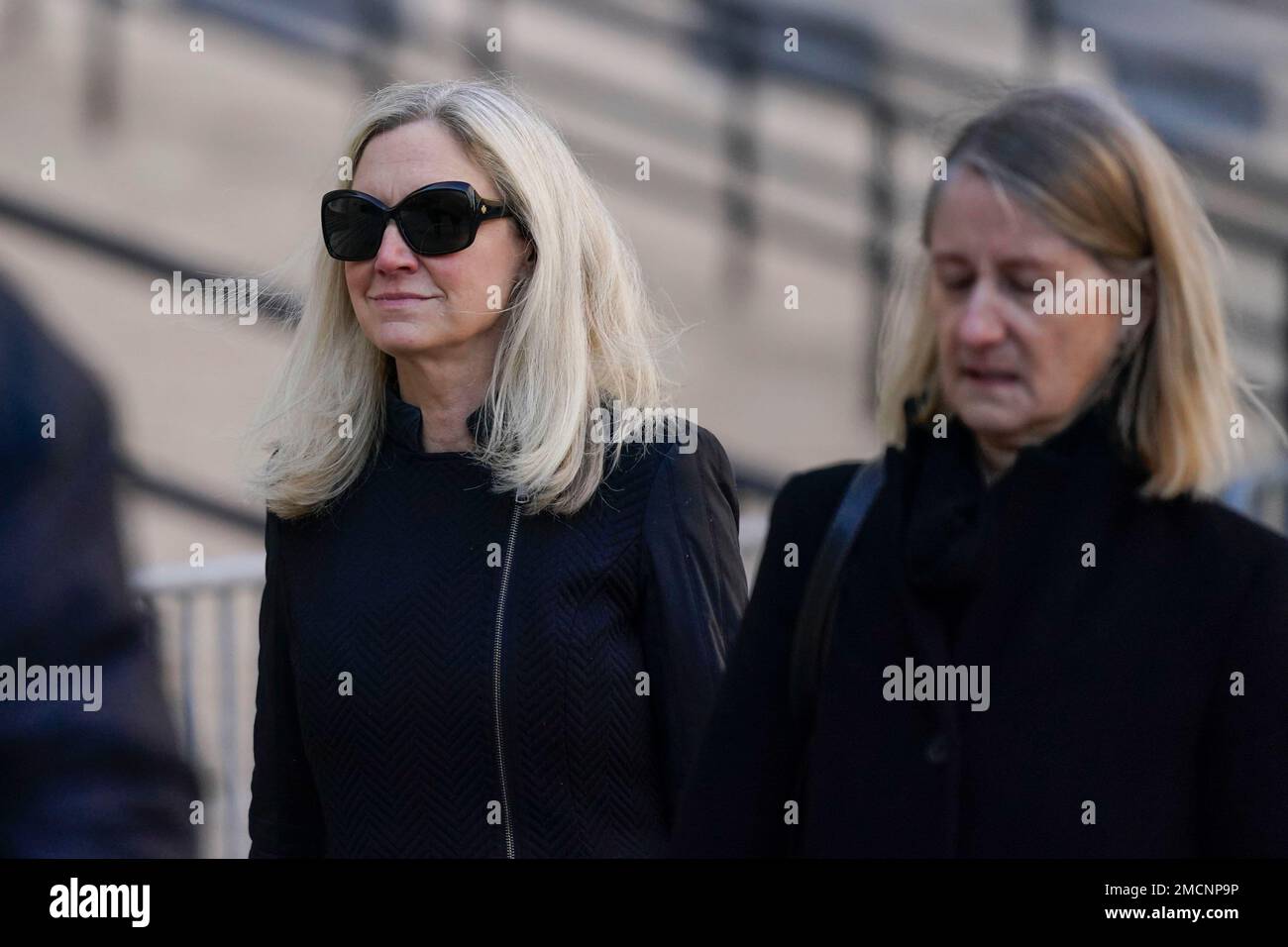 Attorney Laura Menninger, left, arrives to the courthouse in New York ...
