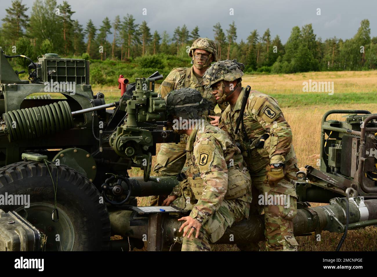 U.S. Army paratroopers assigned to 4th Battalion, 319th Airborne Field Artillery Regiment, 173rd ...
