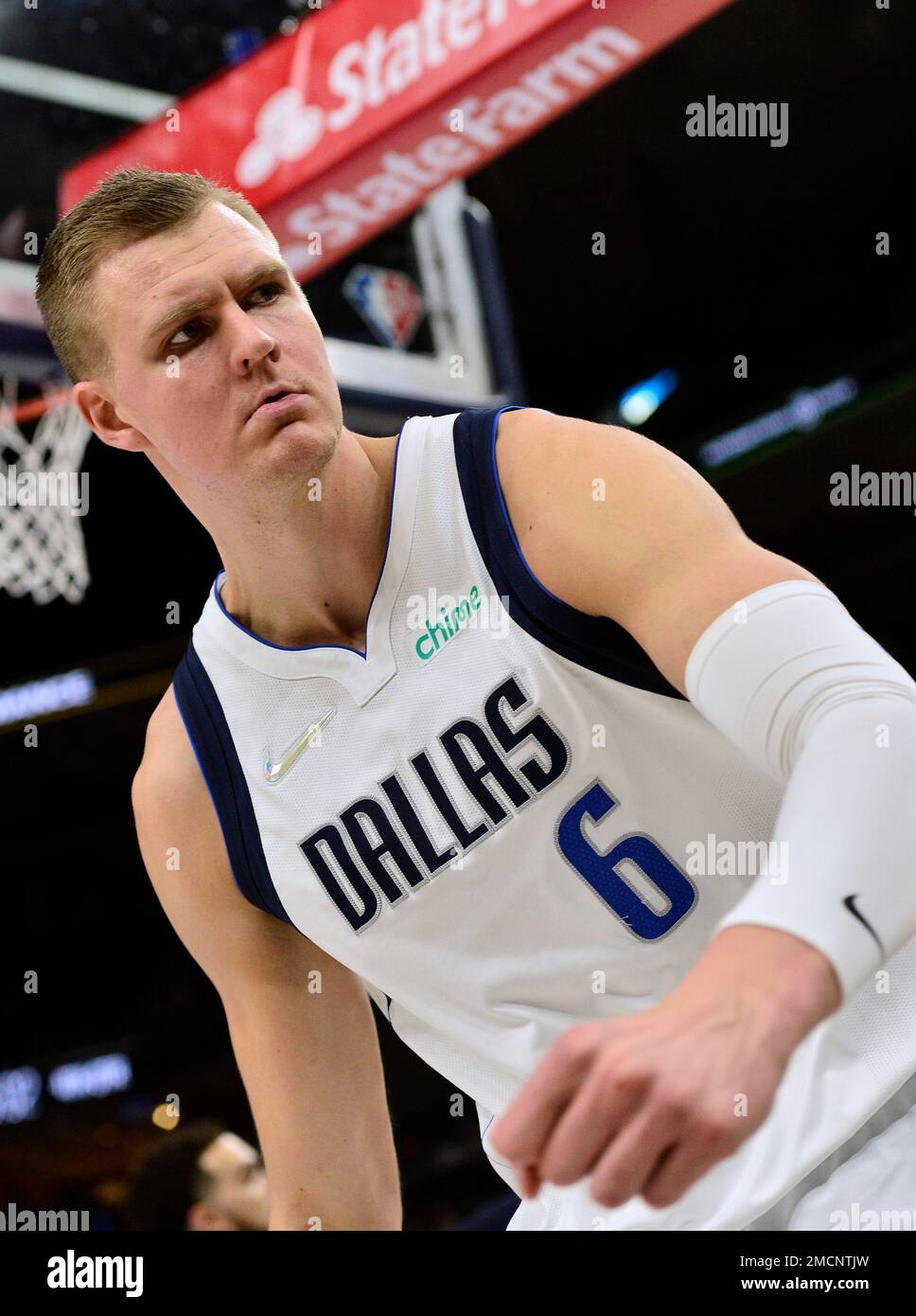 Dallas Mavericks center Kristaps Porzingis reacts after a dunk during ...
