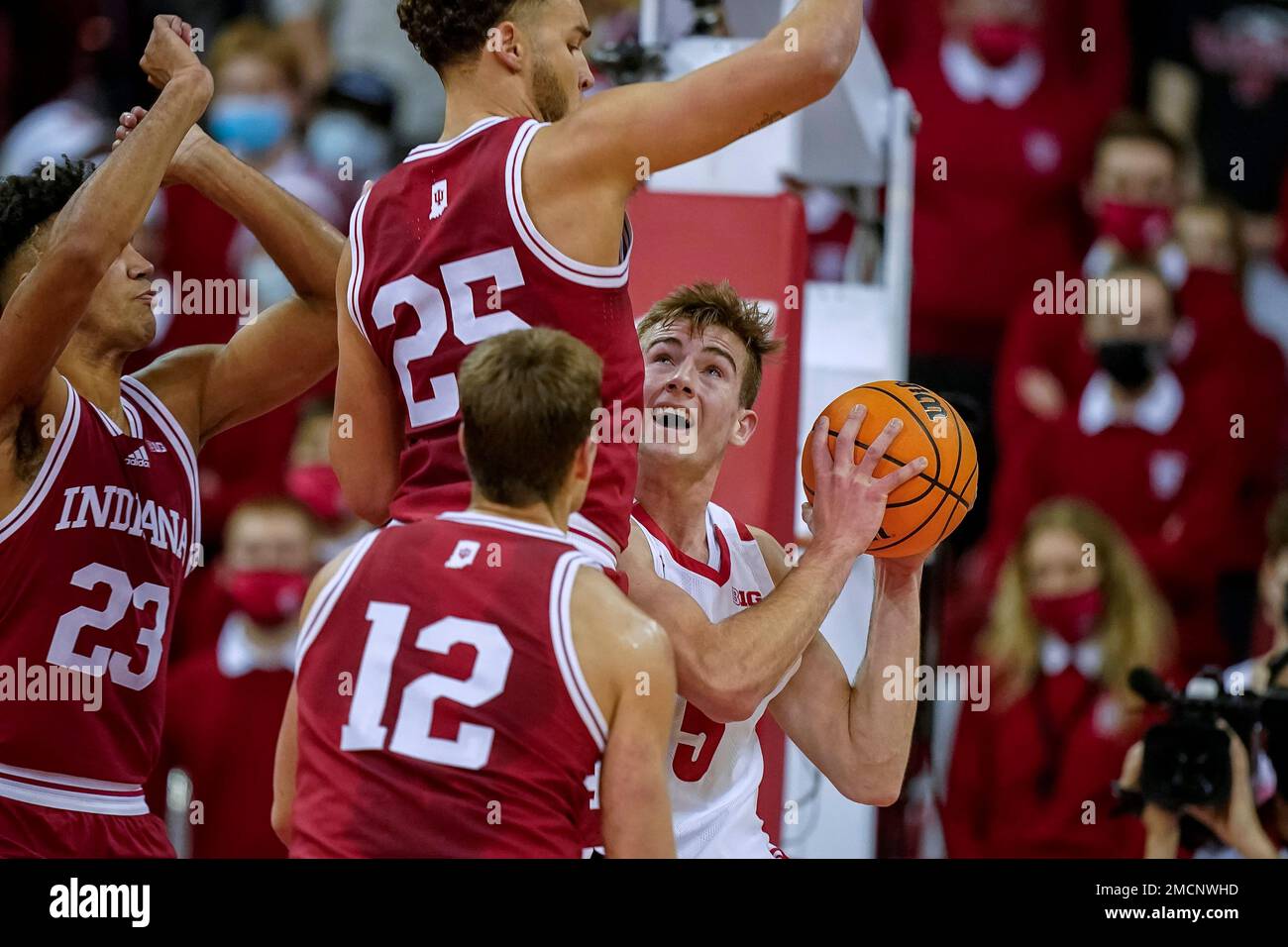 Wisconsin's Tyler Wahl (5) is defended by Indiana's Trayce Jackson ...
