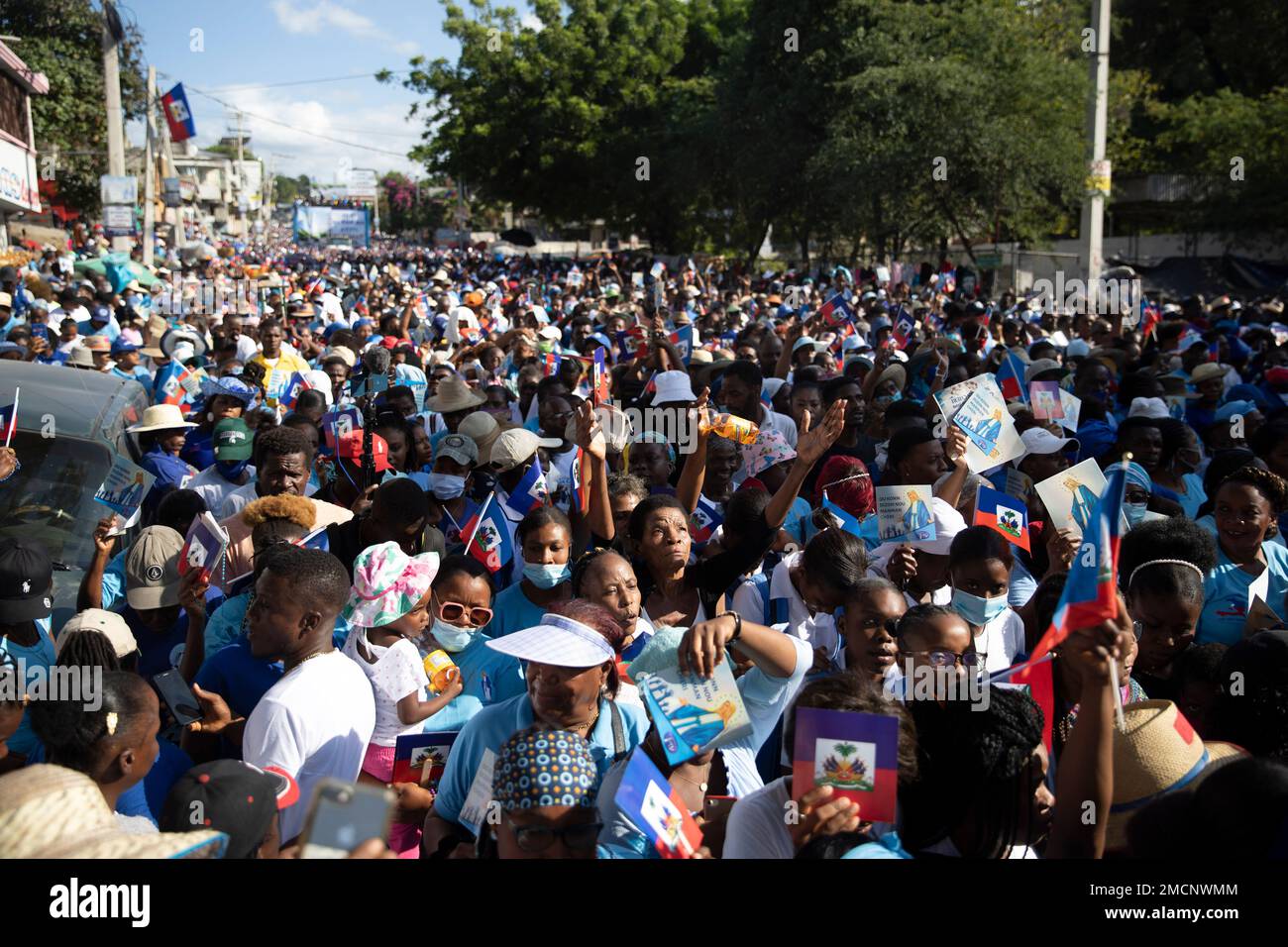 Catholic faithful participate in a procession in observance of the ...