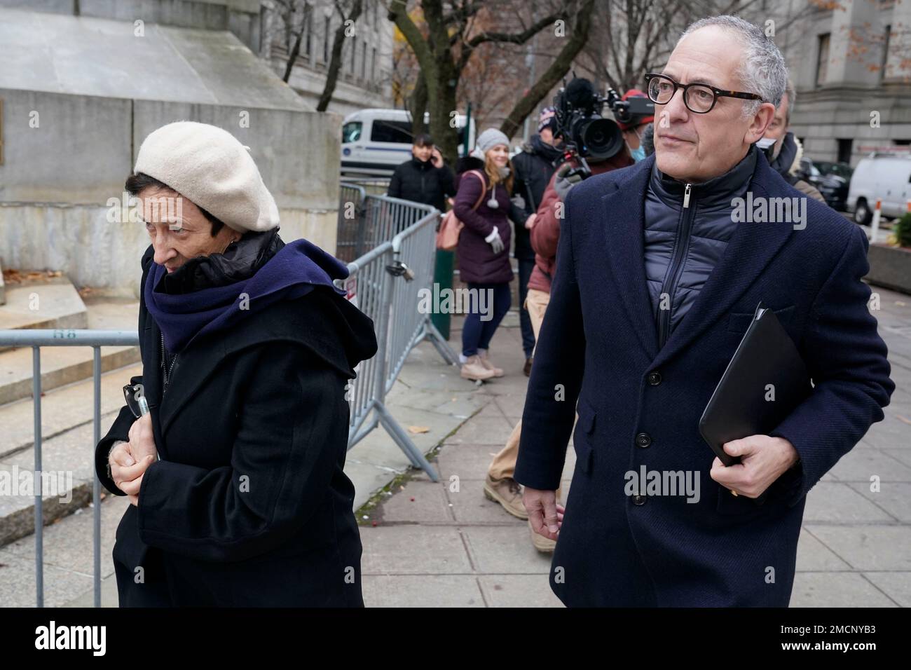 Isabel and Kevin Maxwell leave the courthouse during a lunch break in ...