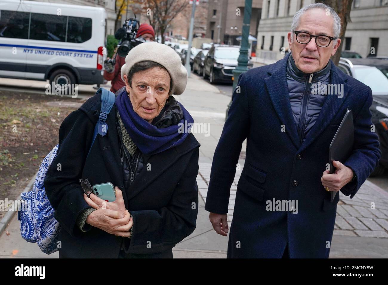 Isabel and Kevin Maxwell leave the courthouse during a lunch break in ...
