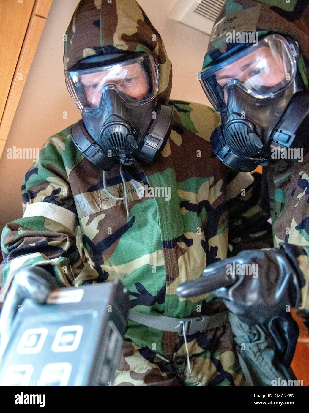 U.S. Air Force Master Sgt. Jason Braun and Staff Sgt. Morgan Johnson ...