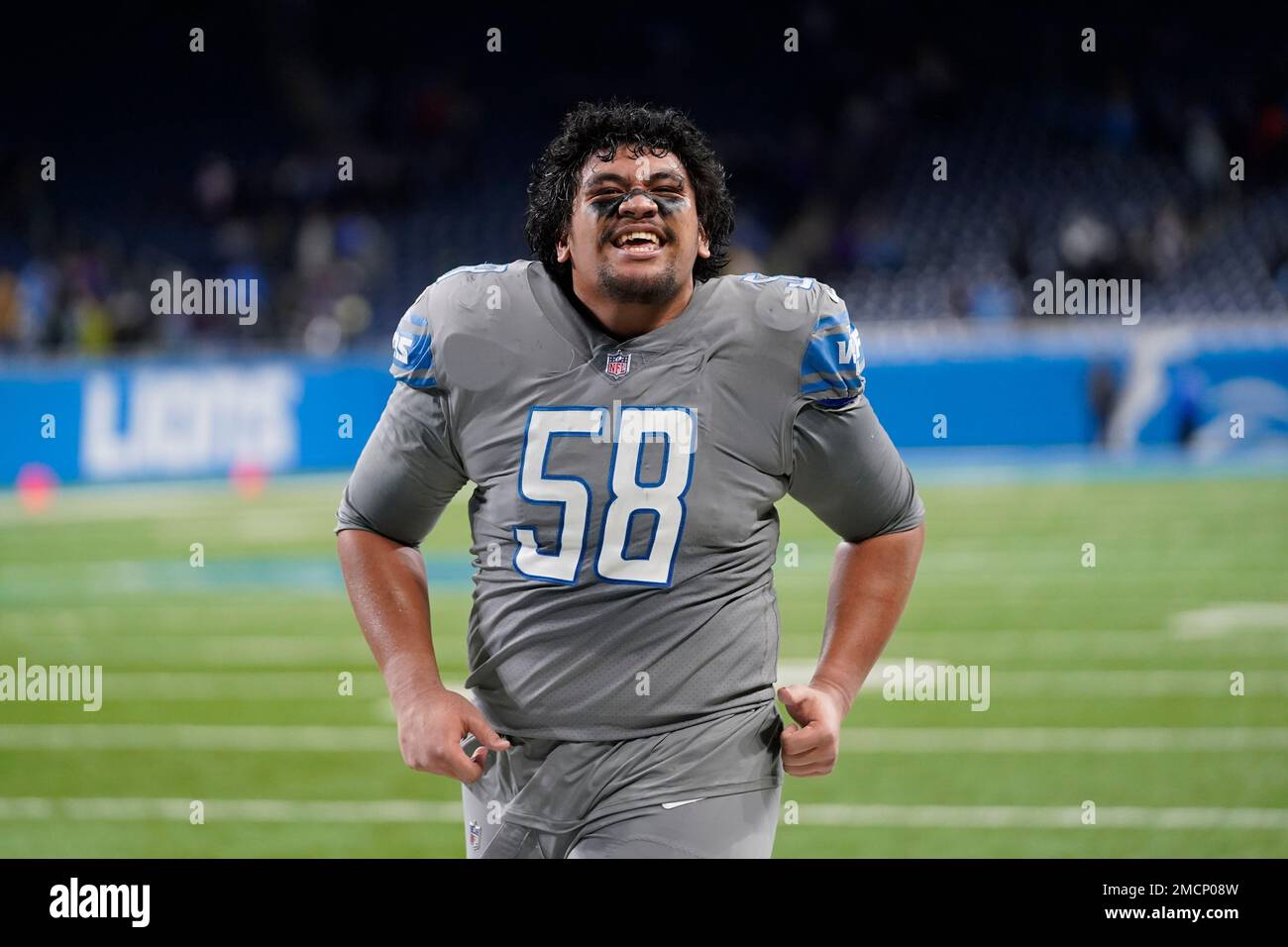 Detroit Lions offensive tackle Penei Sewell (58) smiles after beating ...