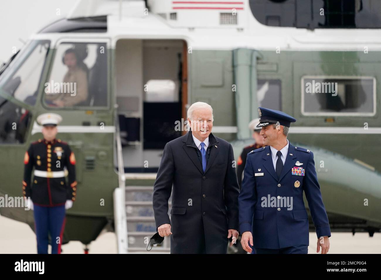 President Joe Biden, escorted by Col. Matthew Getty, 89th Operations ...