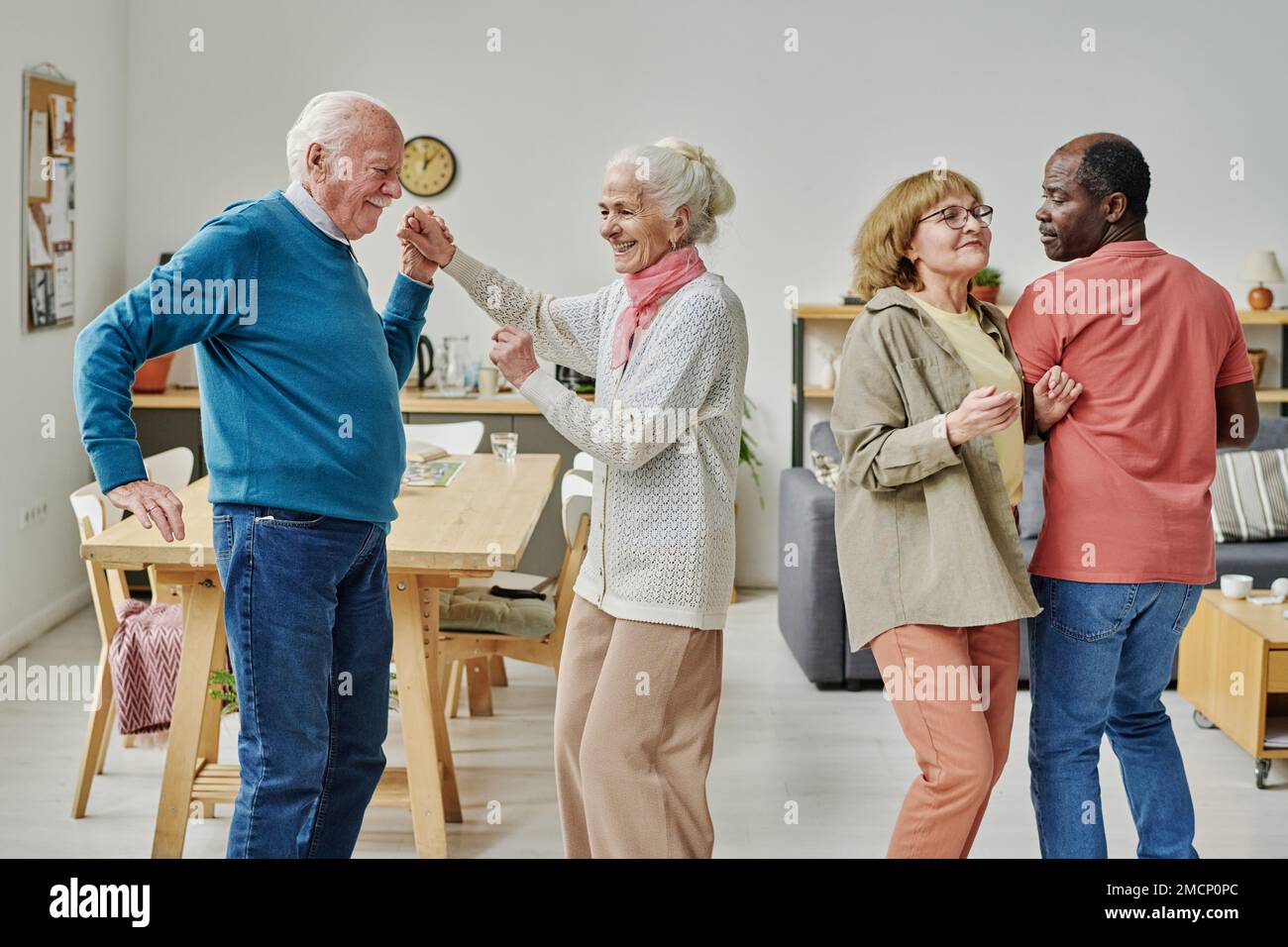 Happy elderly people dancing hi-res stock photography and images - Alamy