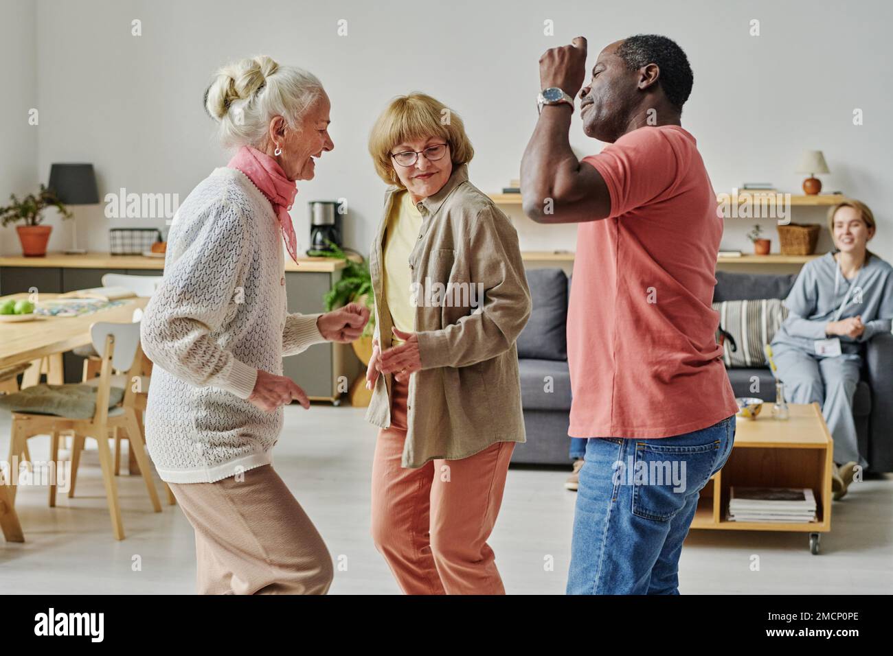 Group of senior people having fun together during party, they dancing ...