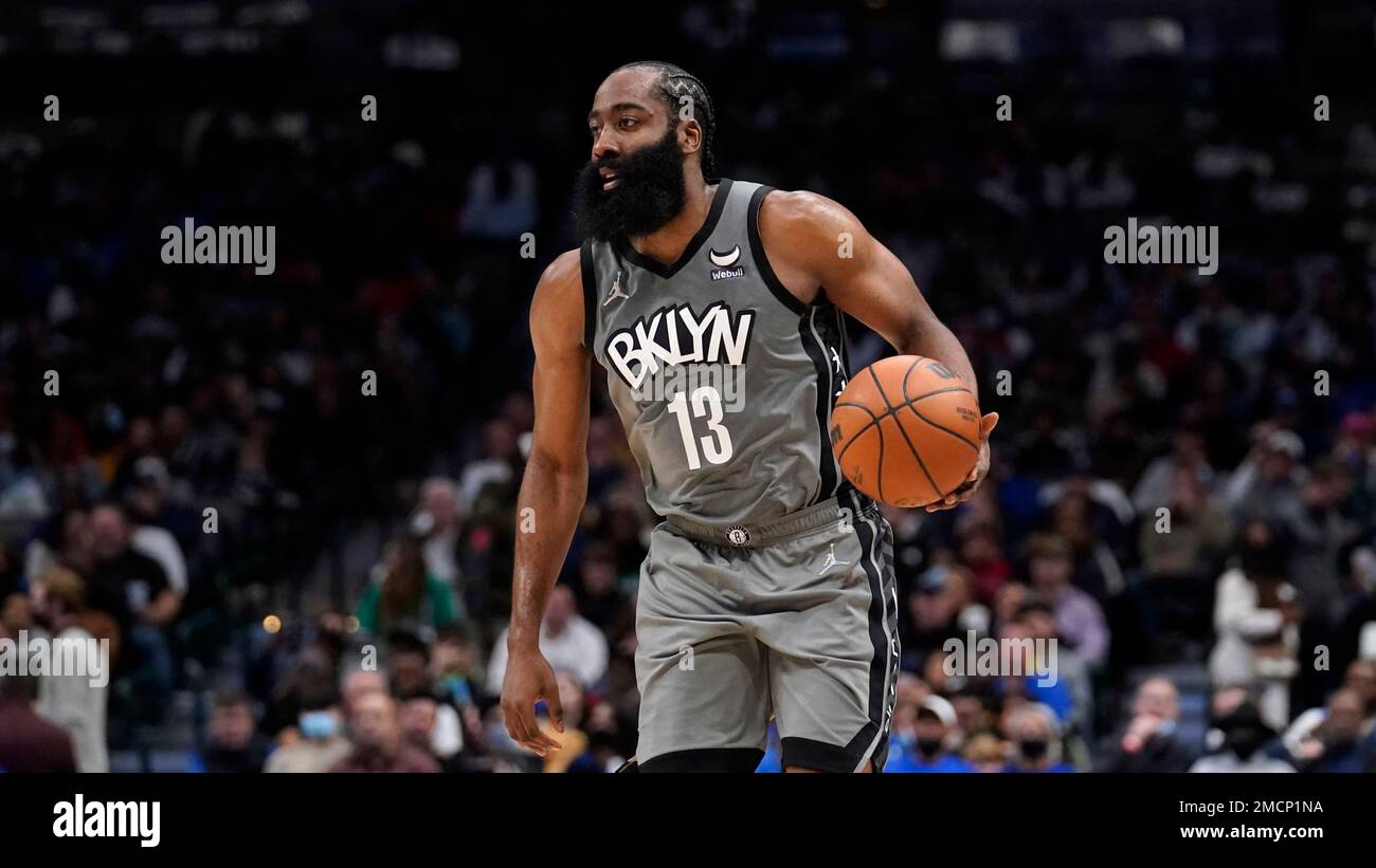 Brooklyn Nets guard James Harden advances the ball against the Dallas ...