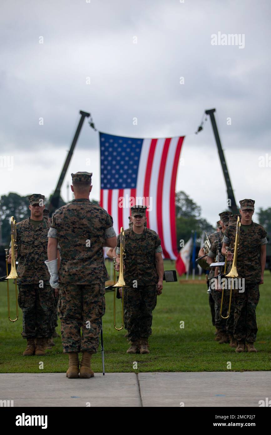U.S. Marines with the 2d Marine Division Band stand in formation at a ...