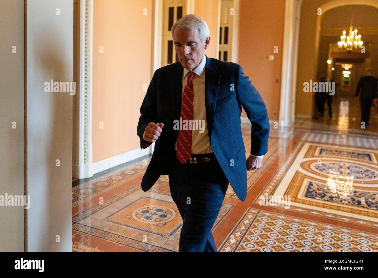 Sen. Rob Portman, R-Ohio, jogs to the Senate Chamber on Capitol Hill in ...