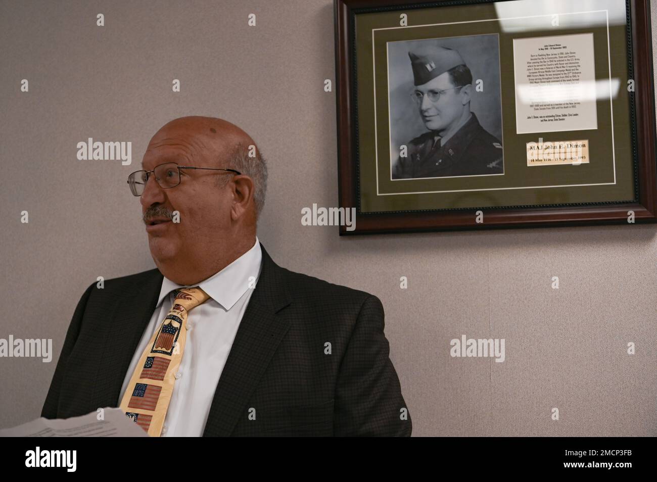 Mark Warner, son of John Edward Dimon, speaks during the unveiling of a ...