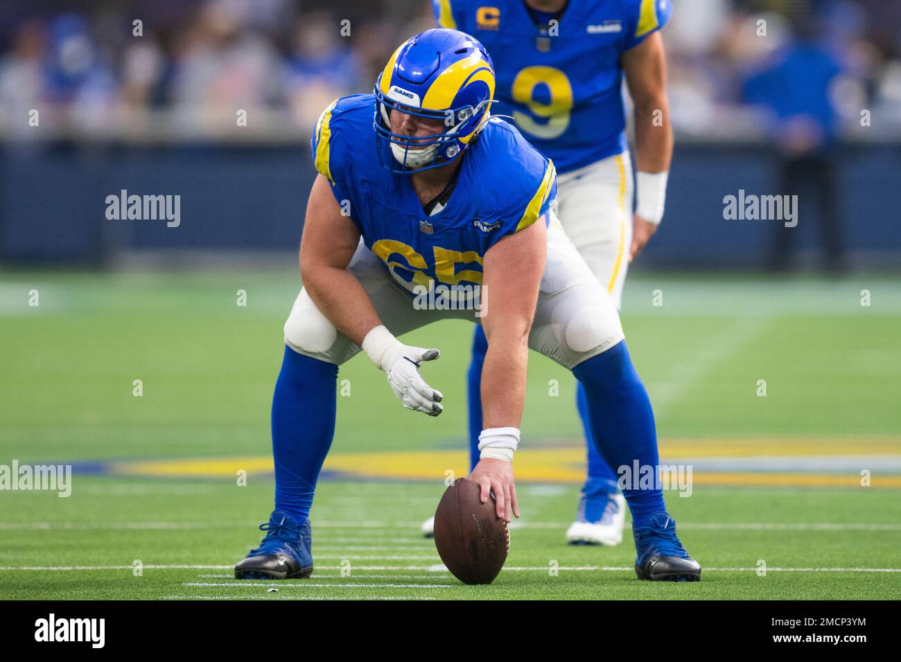 Los Angeles Rams center Coleman Shelton (65) gets ready to snap the ...