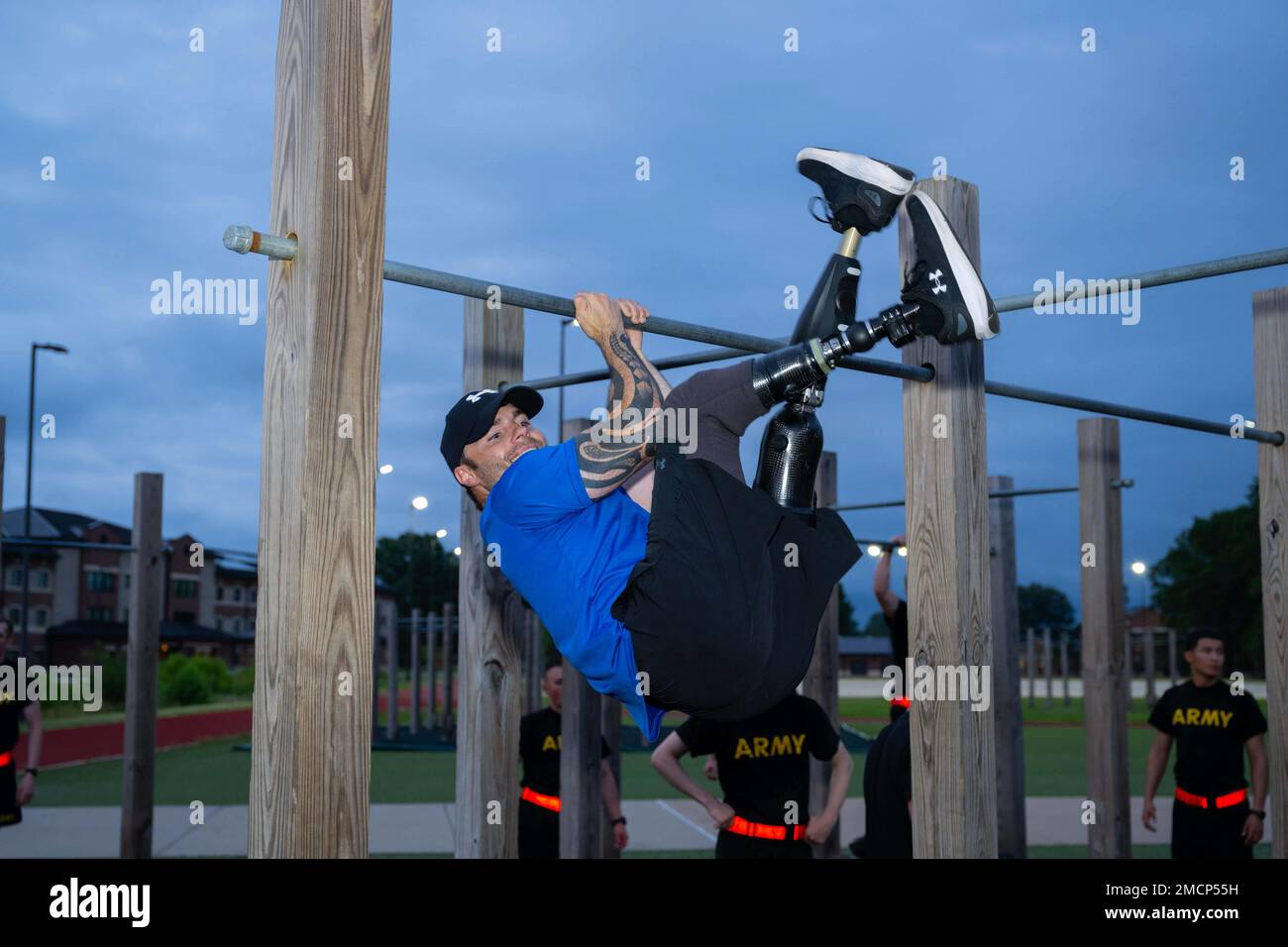 U.S. Army retiree Justin Lane, a Purple Heart recipient, conducts ...