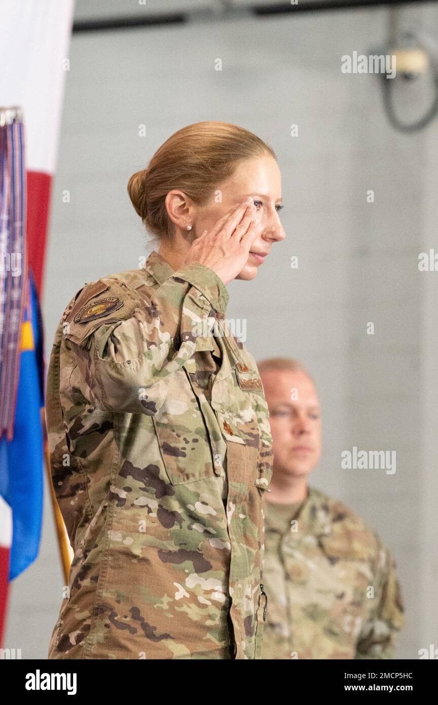 Maj. Randon Davis accepts her first salute as commander of the 436th ...