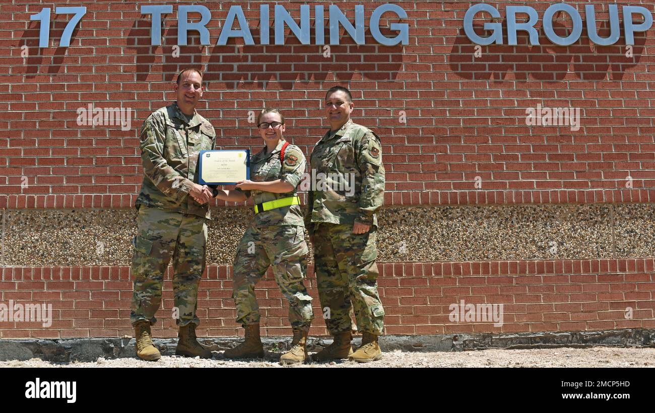 U.S. Air Force Col. Jason Kulchar, 17th Training Group commander, and Chief Master Sgt. Cody ...