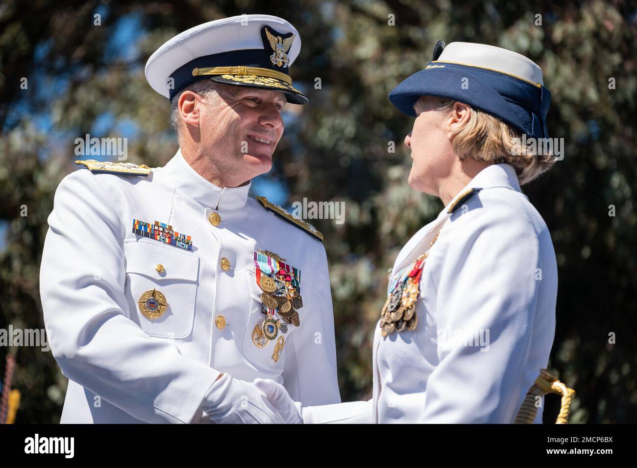 Coast Guard Commandant Adm. Linda L. Fagan shakes hands with Vice Adm ...