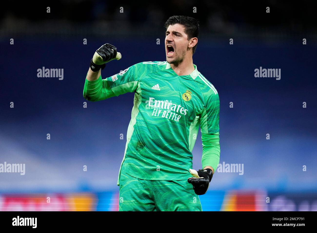 Real Madrid's goalkeeper Thibaut Courtois celebrates after teammate ...