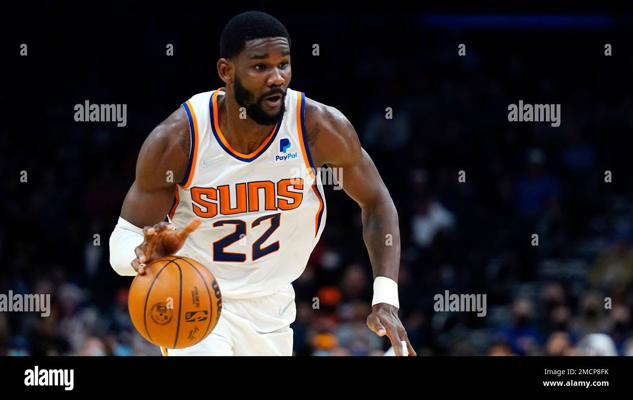 Phoenix Suns center Deandre Ayton dribbles the ball against the San ...