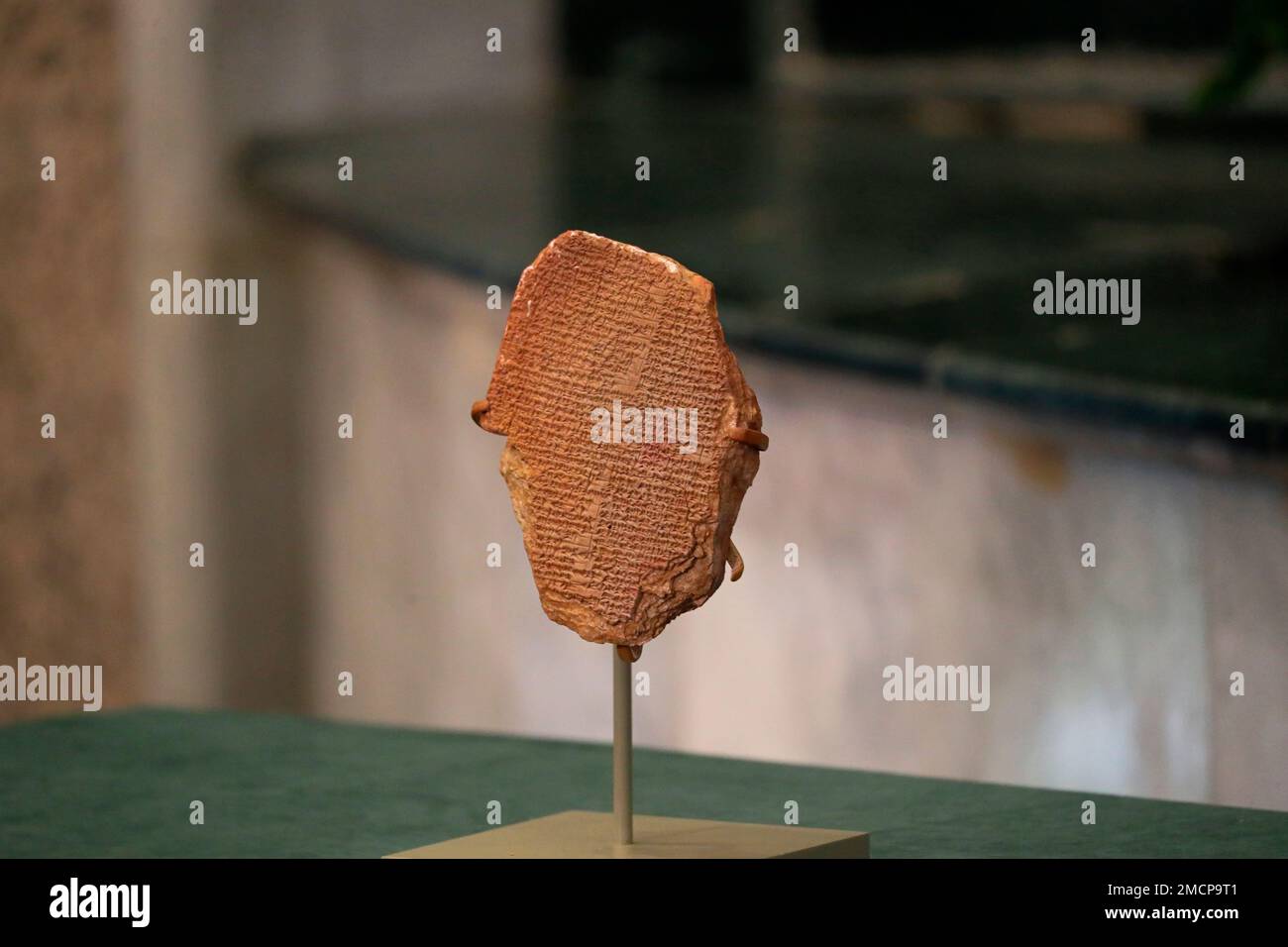 A recovered clay tablet is displayed at the Ministry of Foreign Affairs ...