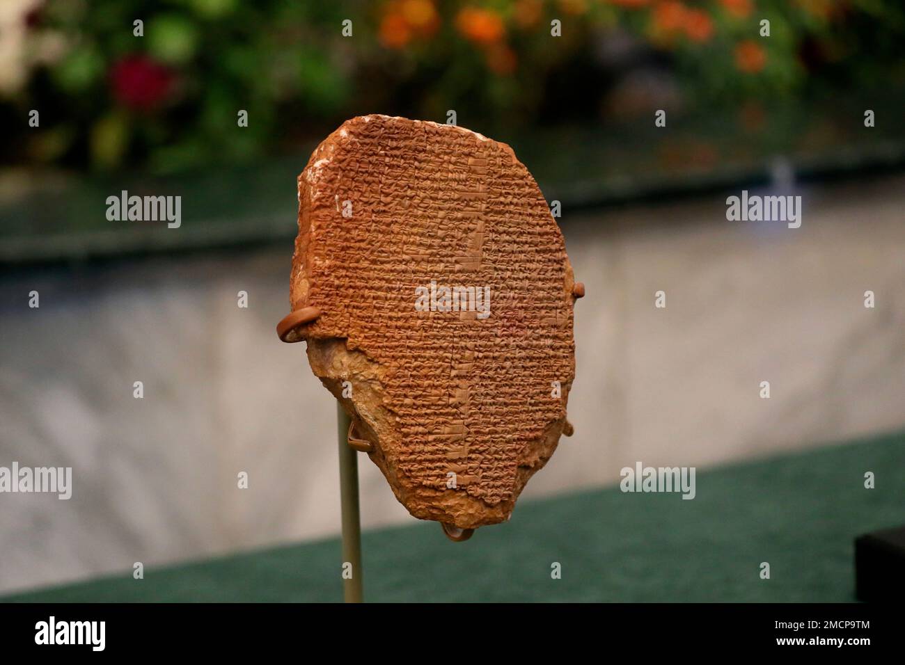 A recovered clay tablet from the United States is displayed at the ...