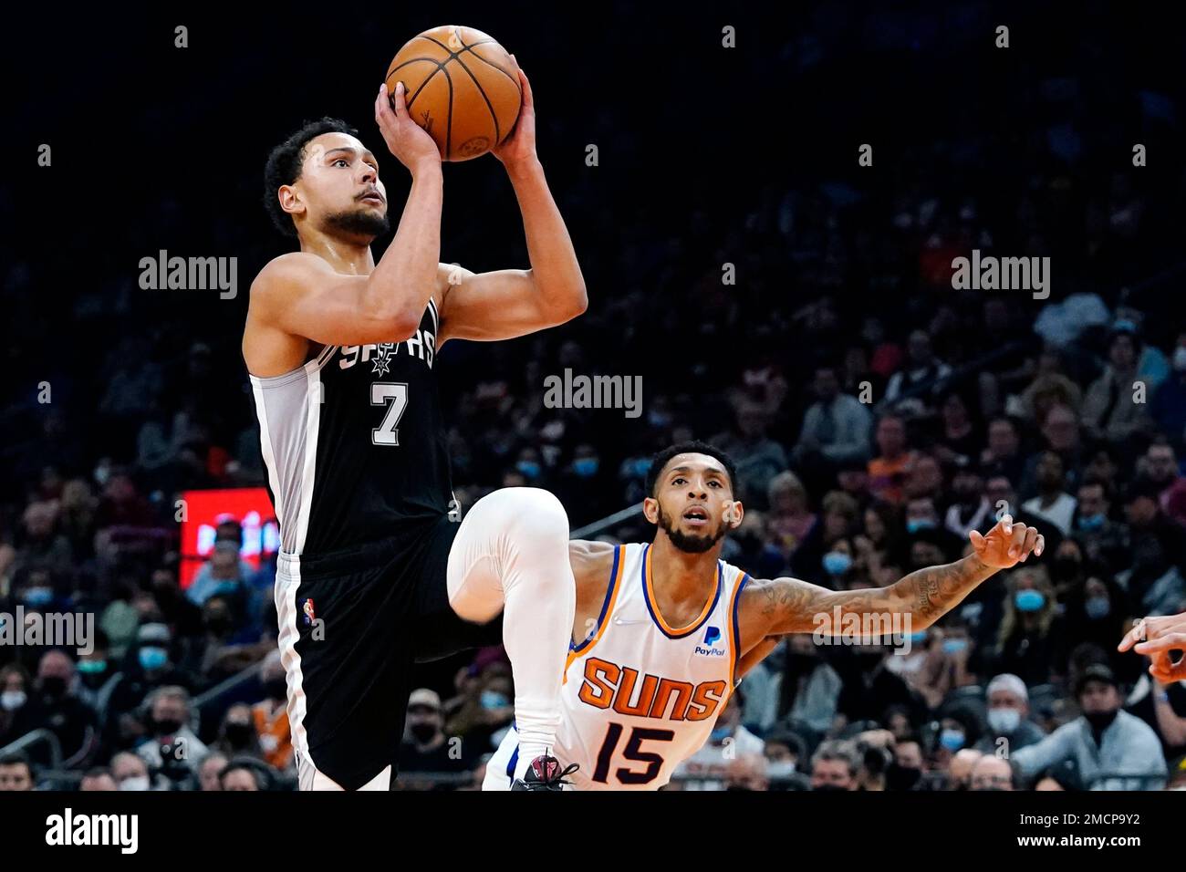 San Antonio Spurs guard Bryn Forbes (7) drives past Phoenix Suns guard ...