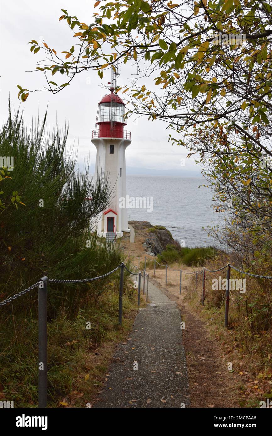 A vertical shot of a pathway to the Sheringham Point Lighthouse Stock ...