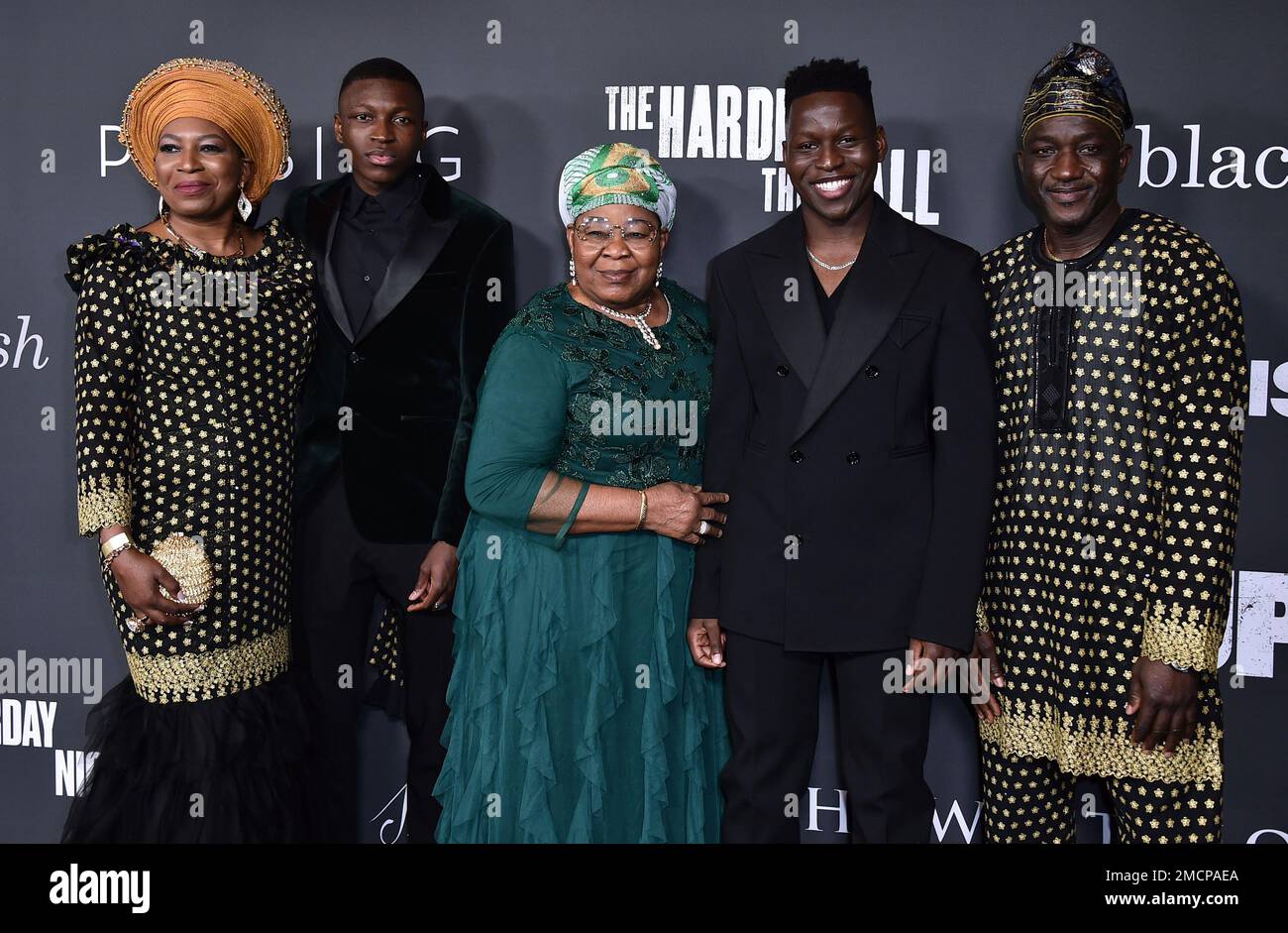 Toheeb Jimoh, second from right, arrives at the fourth annual ...