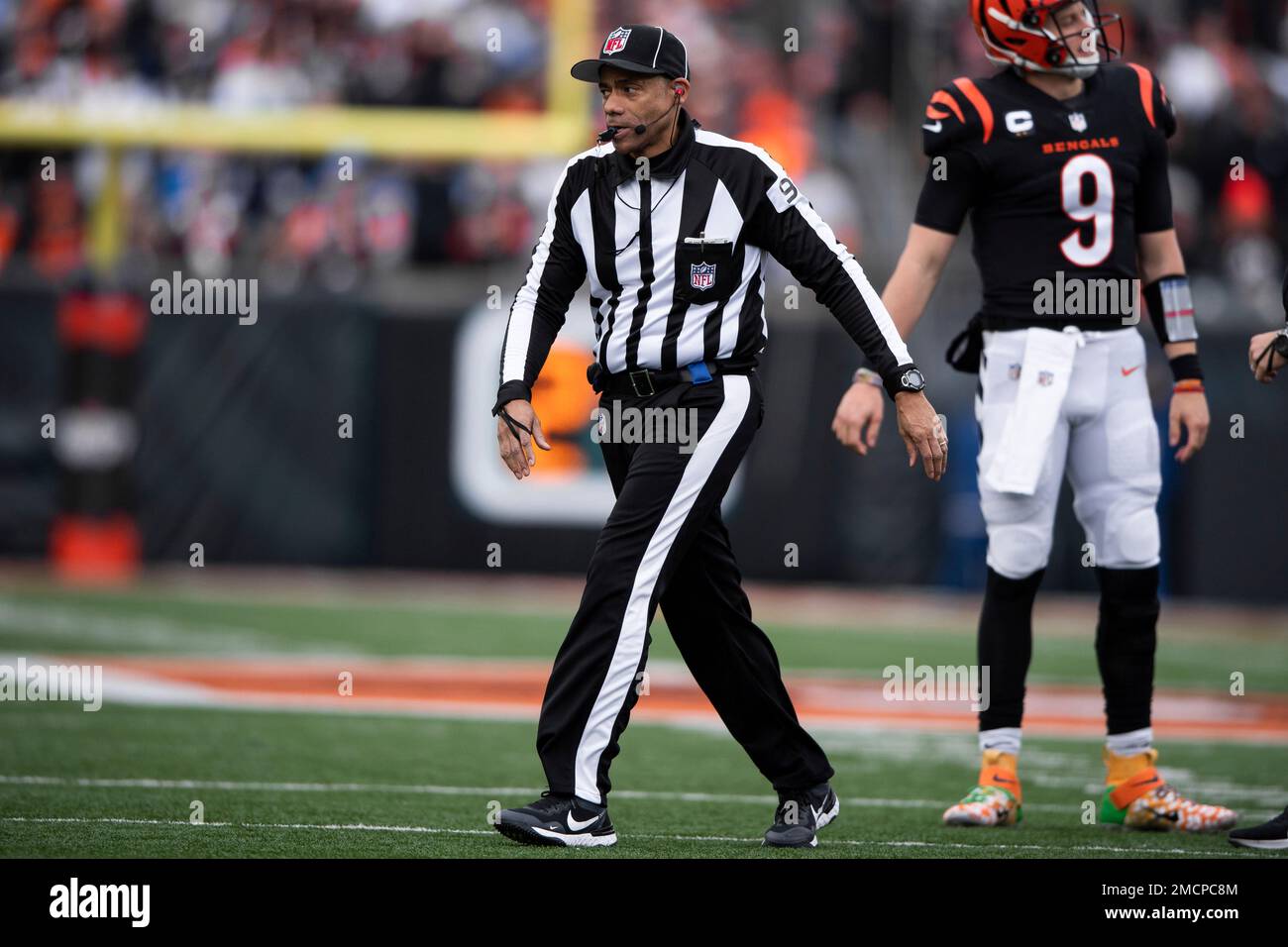 NFL line judge Greg Bradley (98) on the field during an NFL football ...