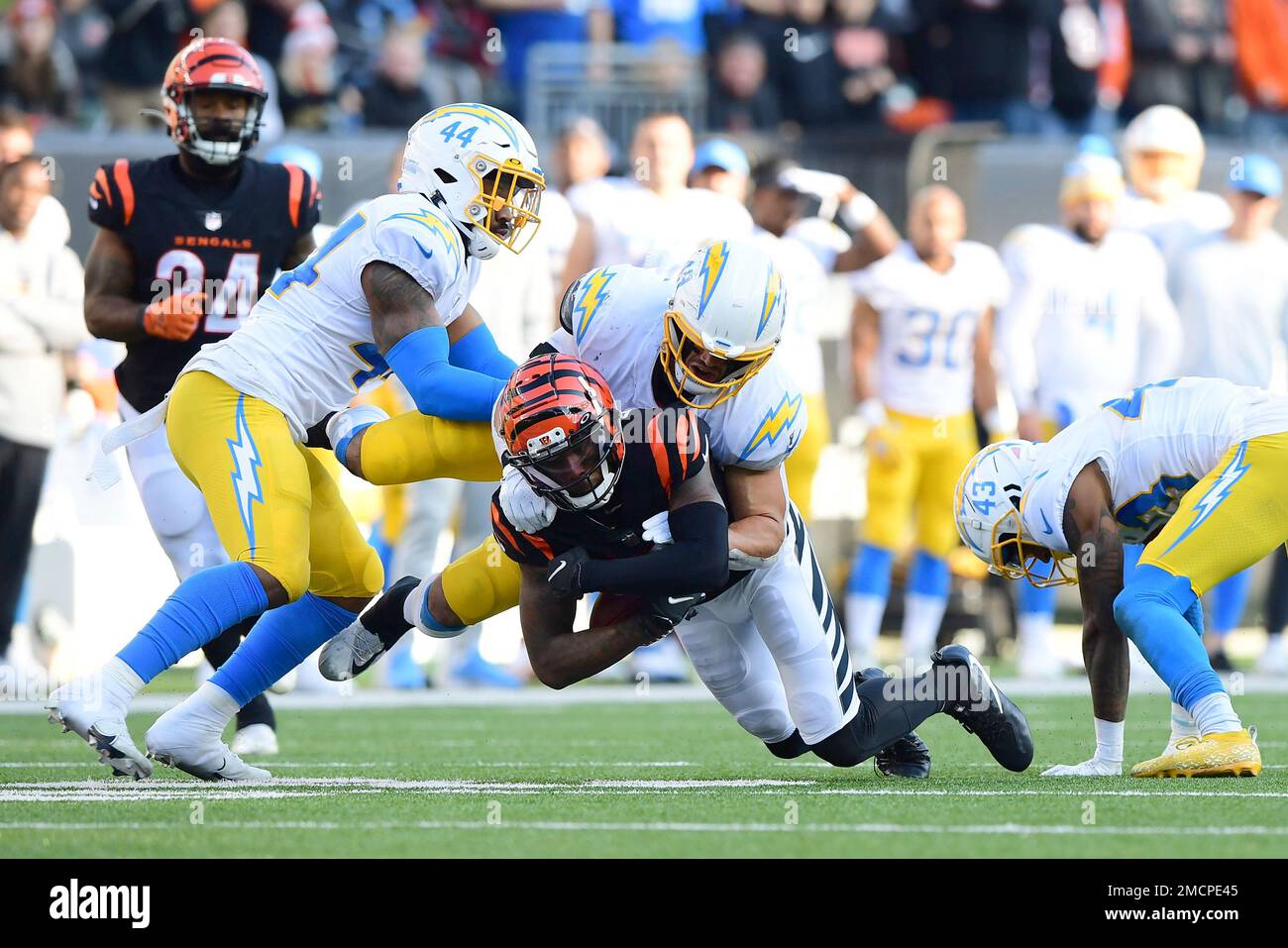 Cincinnati Bengals wide receiver Ja'Marr Chase (1) is tackled as he ...