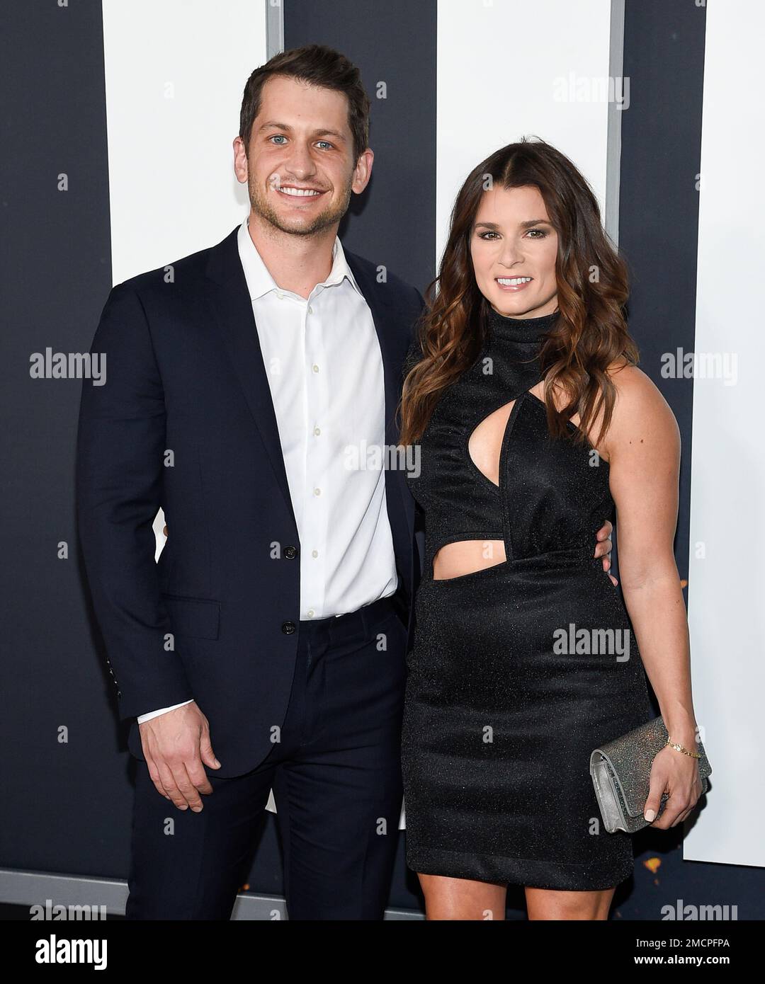 Danica Patrick, right, and boyfriend Carter Comstock attend the world ...