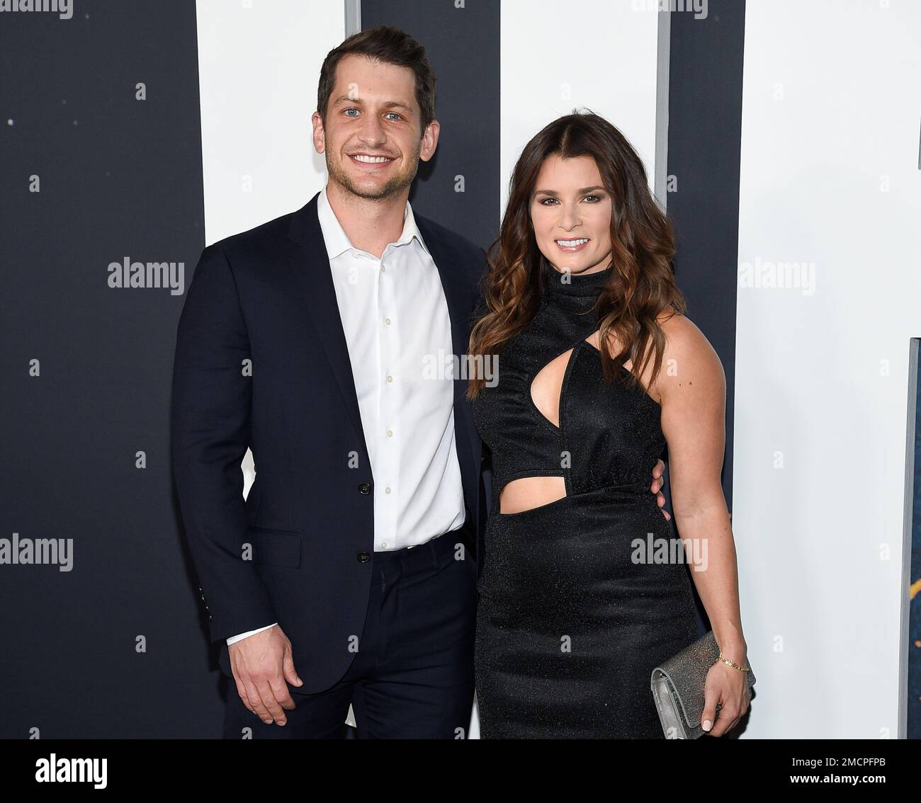 Danica Patrick, right, and boyfriend Carter Comstock attend the world ...