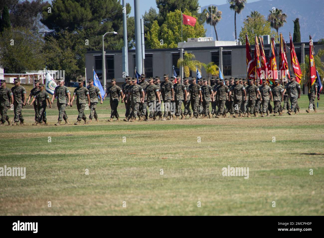 U.S. Marines with 1st Marine Division walk onto the parade deck during ...