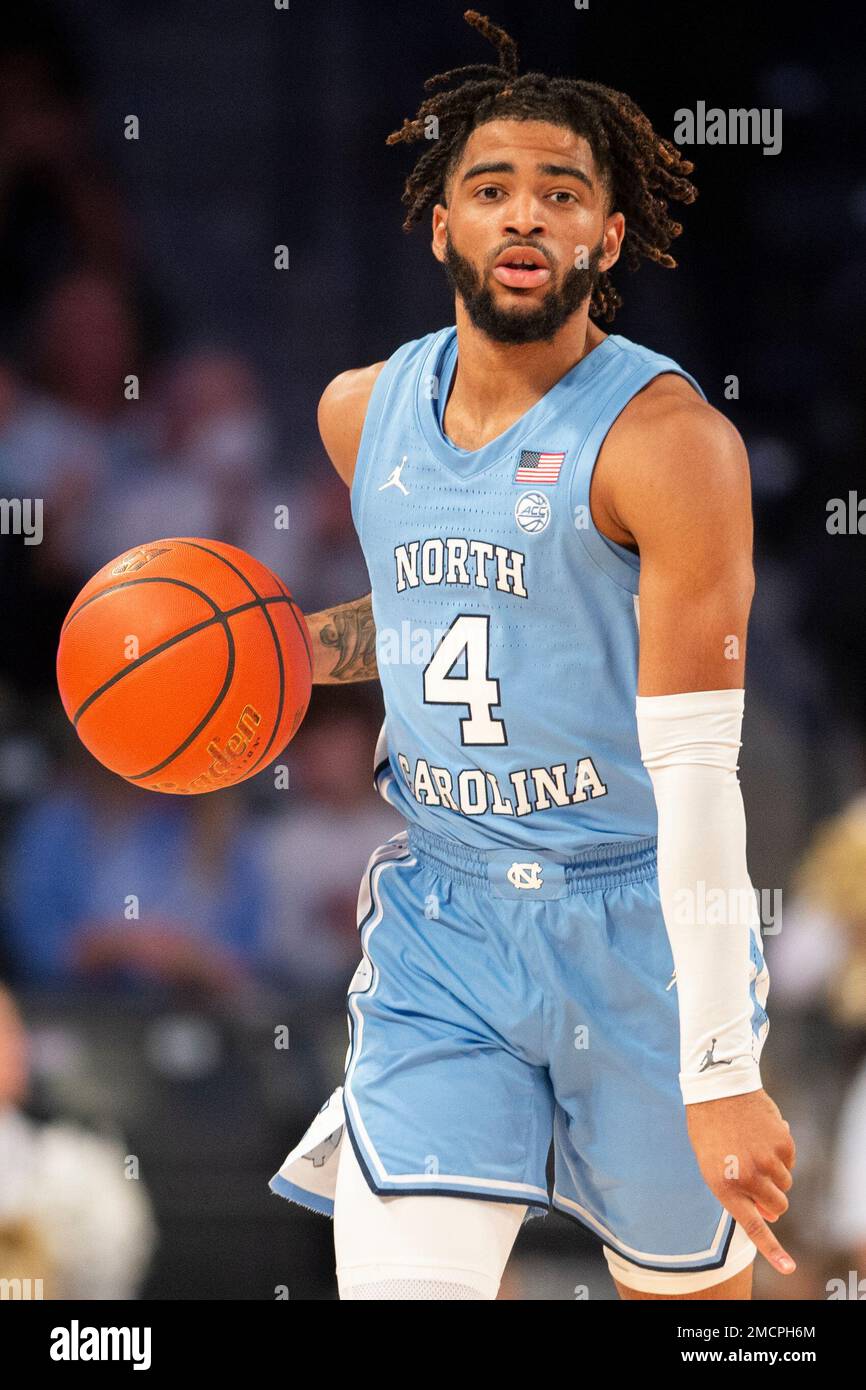 North Carolina guard R.J. Davis (4) dribbles up court during the first ...