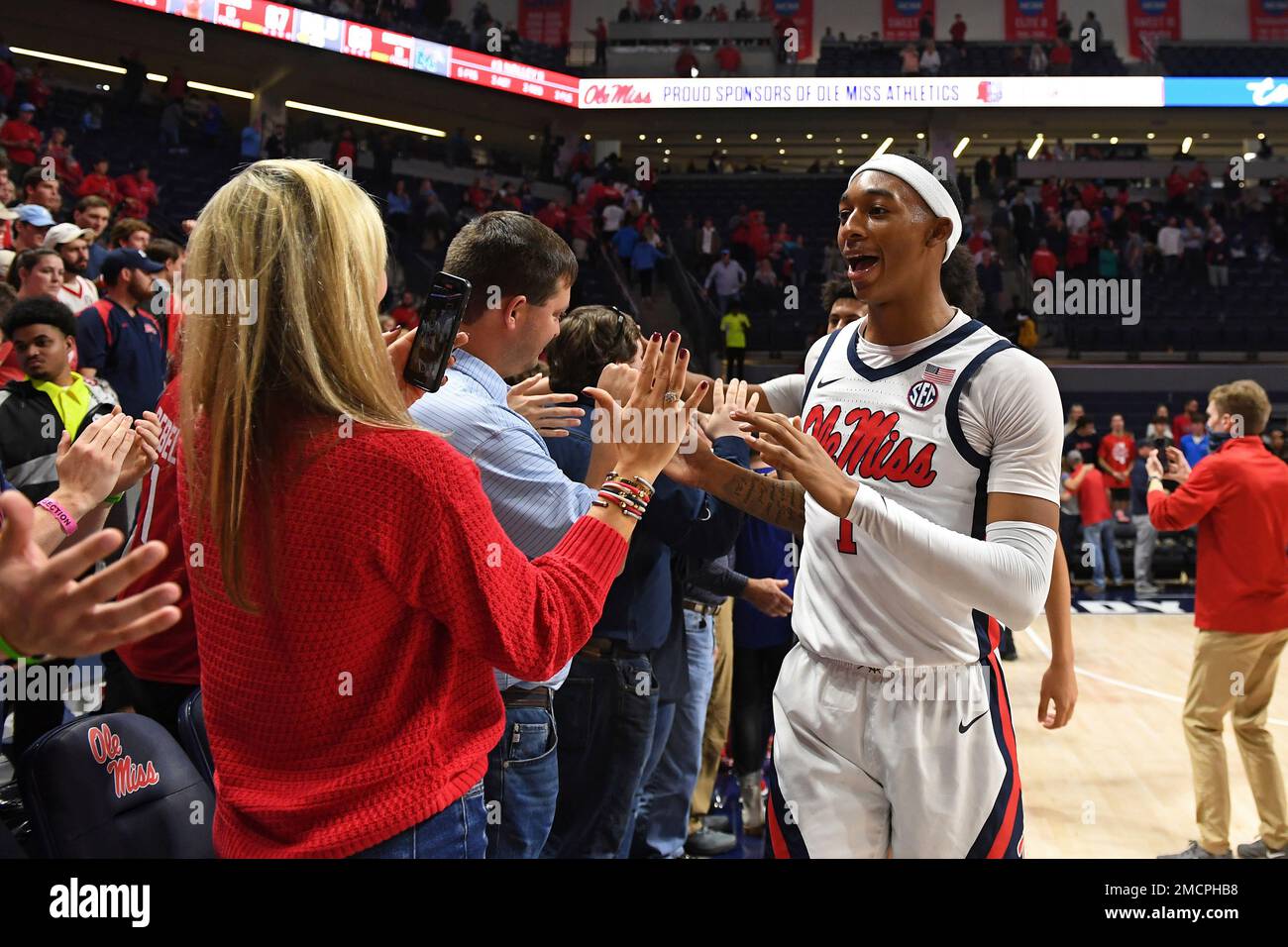 Mississippi guard Austin Crowley (1) celebrates with fans after an NCAA ...