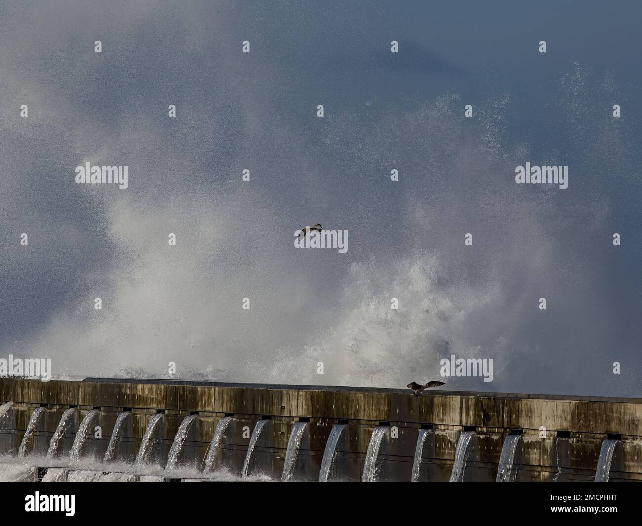 Stormy wave splash and spray at the Douro river mouth, Porti, Portugal ...