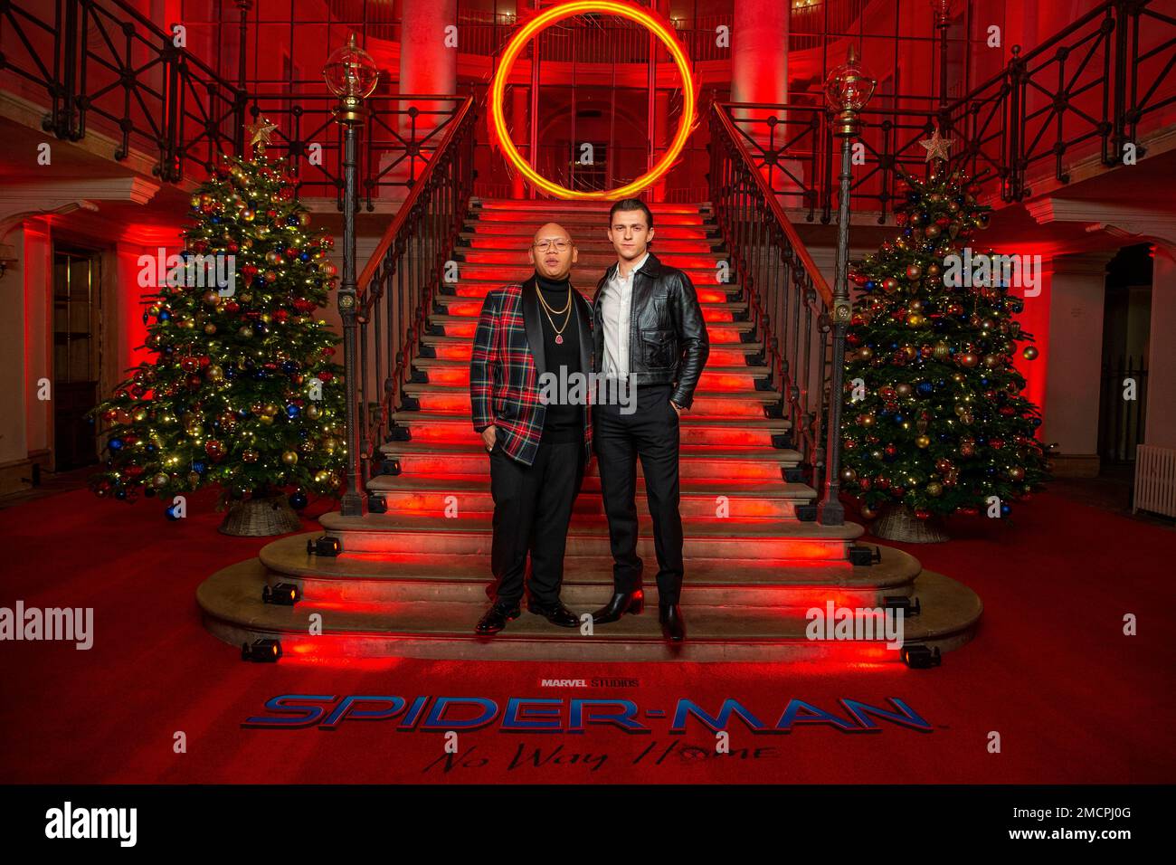 Jacob Batalon and Tom Holland pose for photographers at the photo call ...