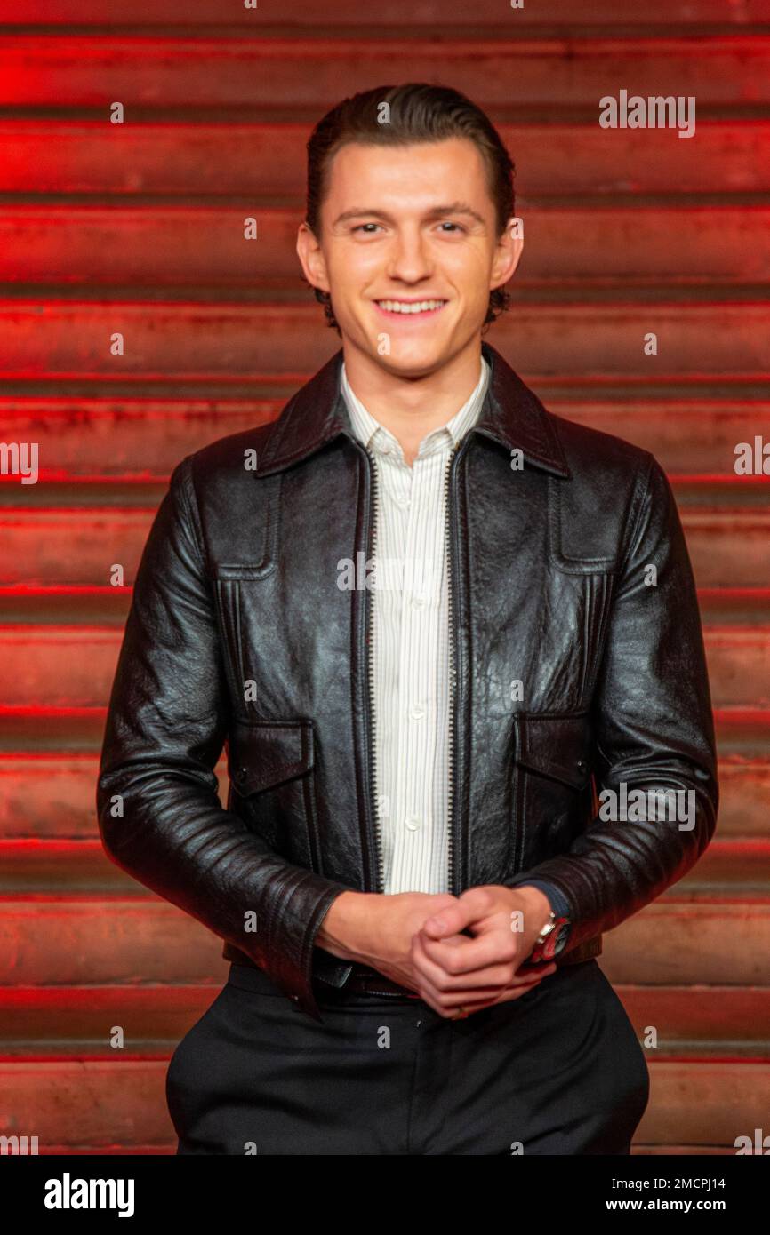 Tom Holland poses for photographers at the photo call for the film ...
