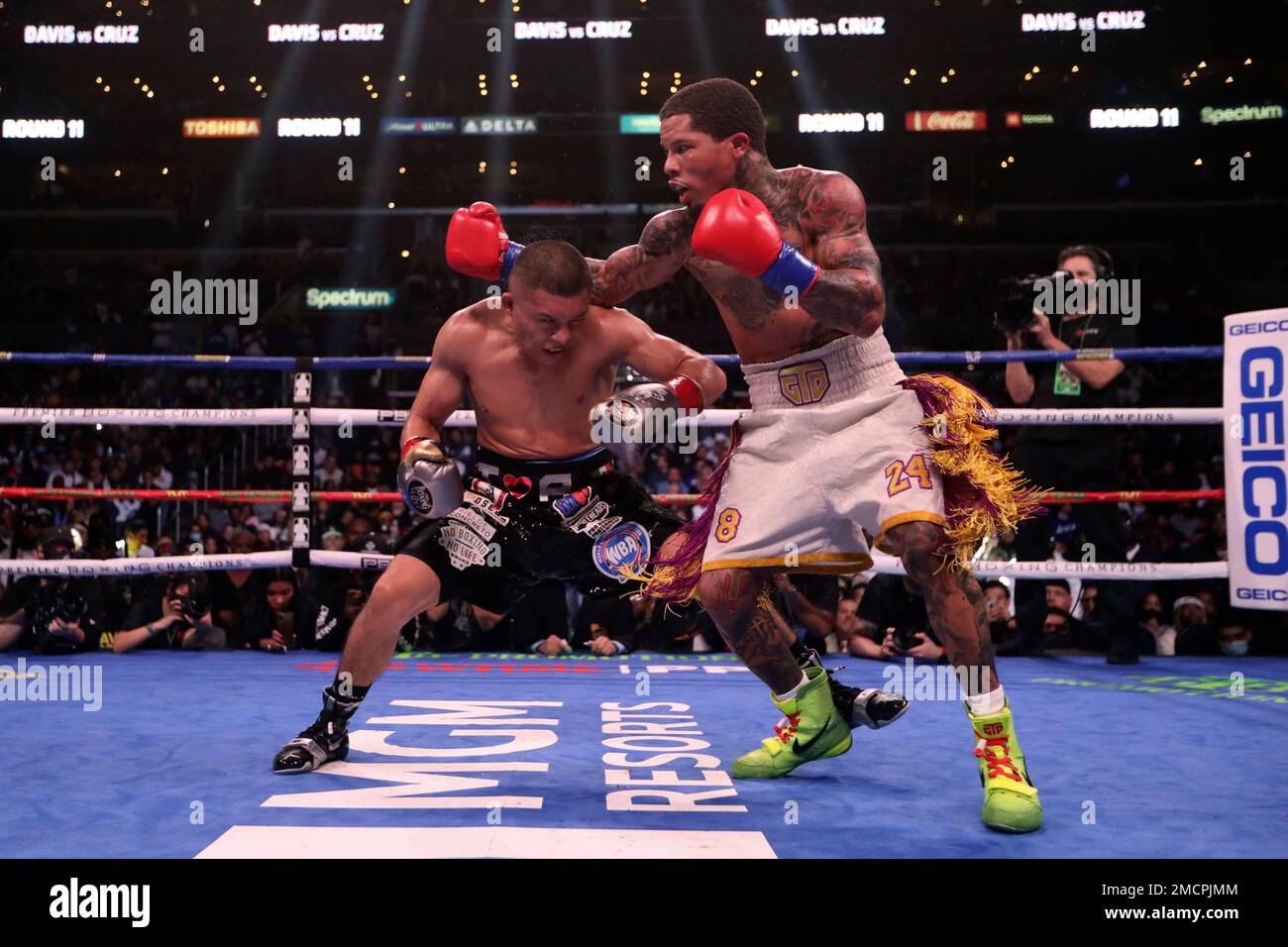 Gervonta Davis, right, throws a punch at Isaac Cruz during their WBC ...