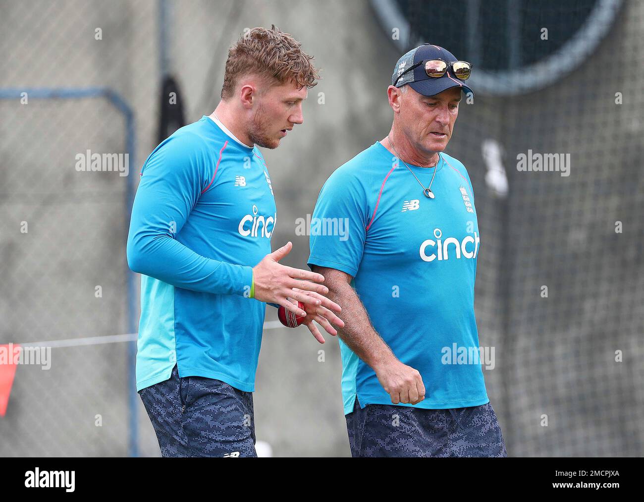 England's Dom Bess talks to batting coach Graham Thorpe during their ...