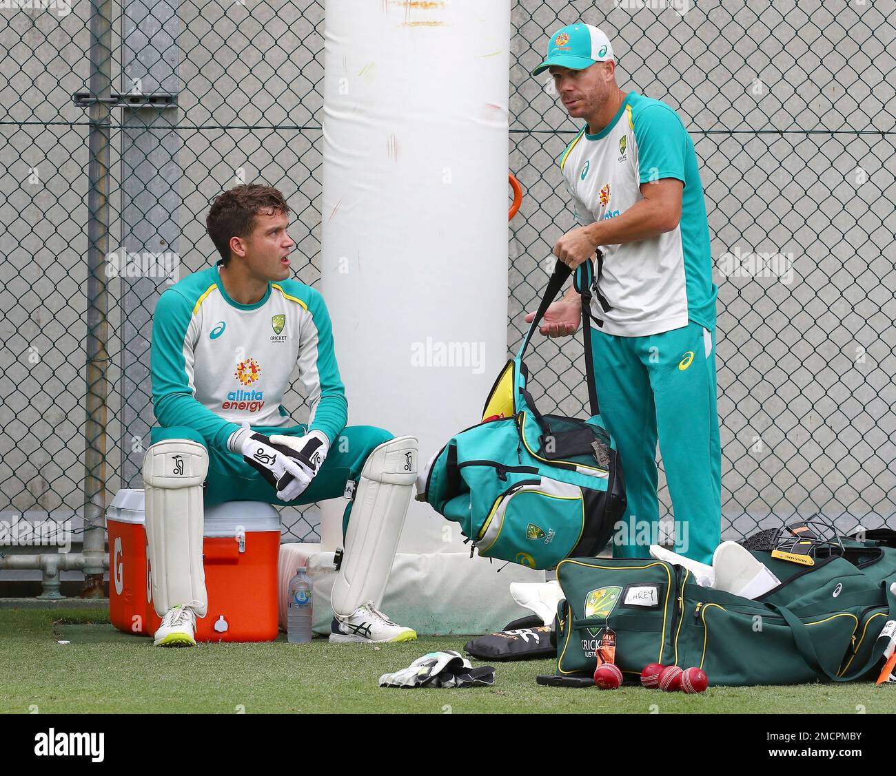 Australia's new wicket keeper Alex Carey, left, talks to Dave Warner ...