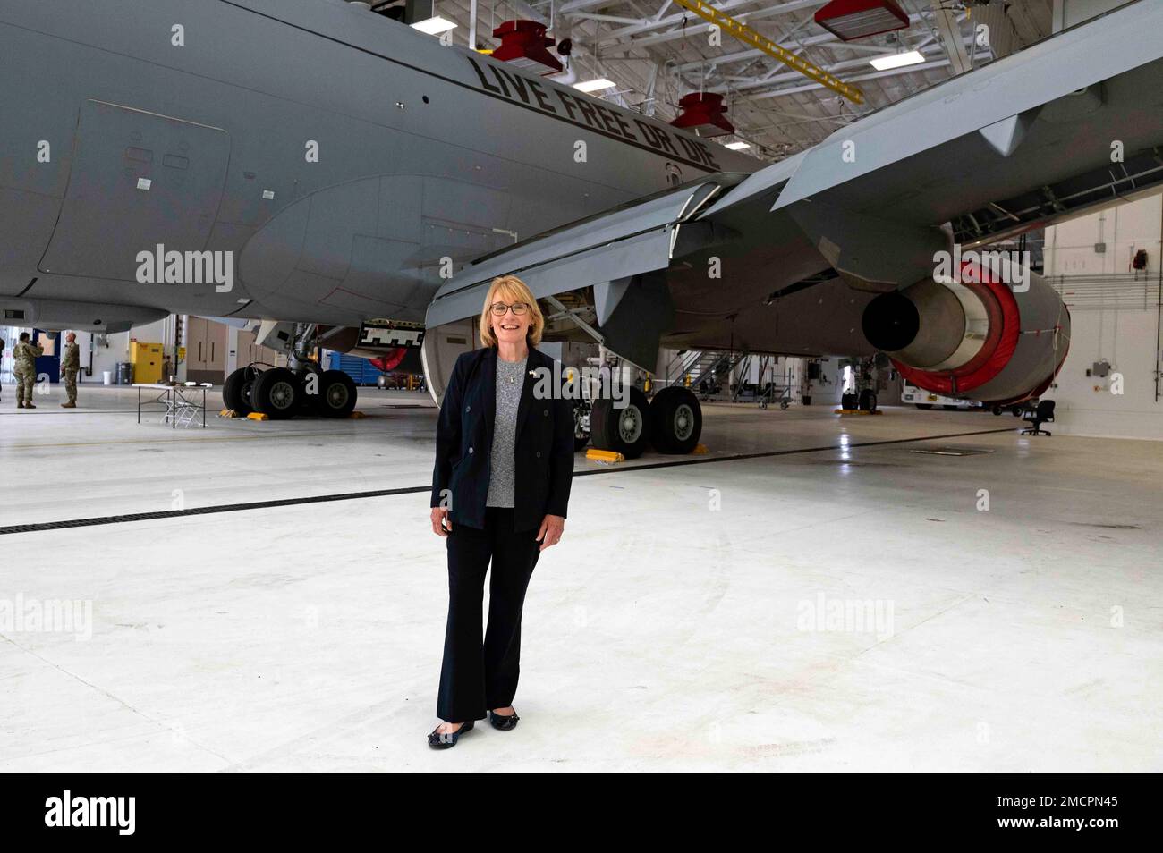 Sen. Maggie Hassan stands before the "Spirit of Portsmouth," a KC-46A ...