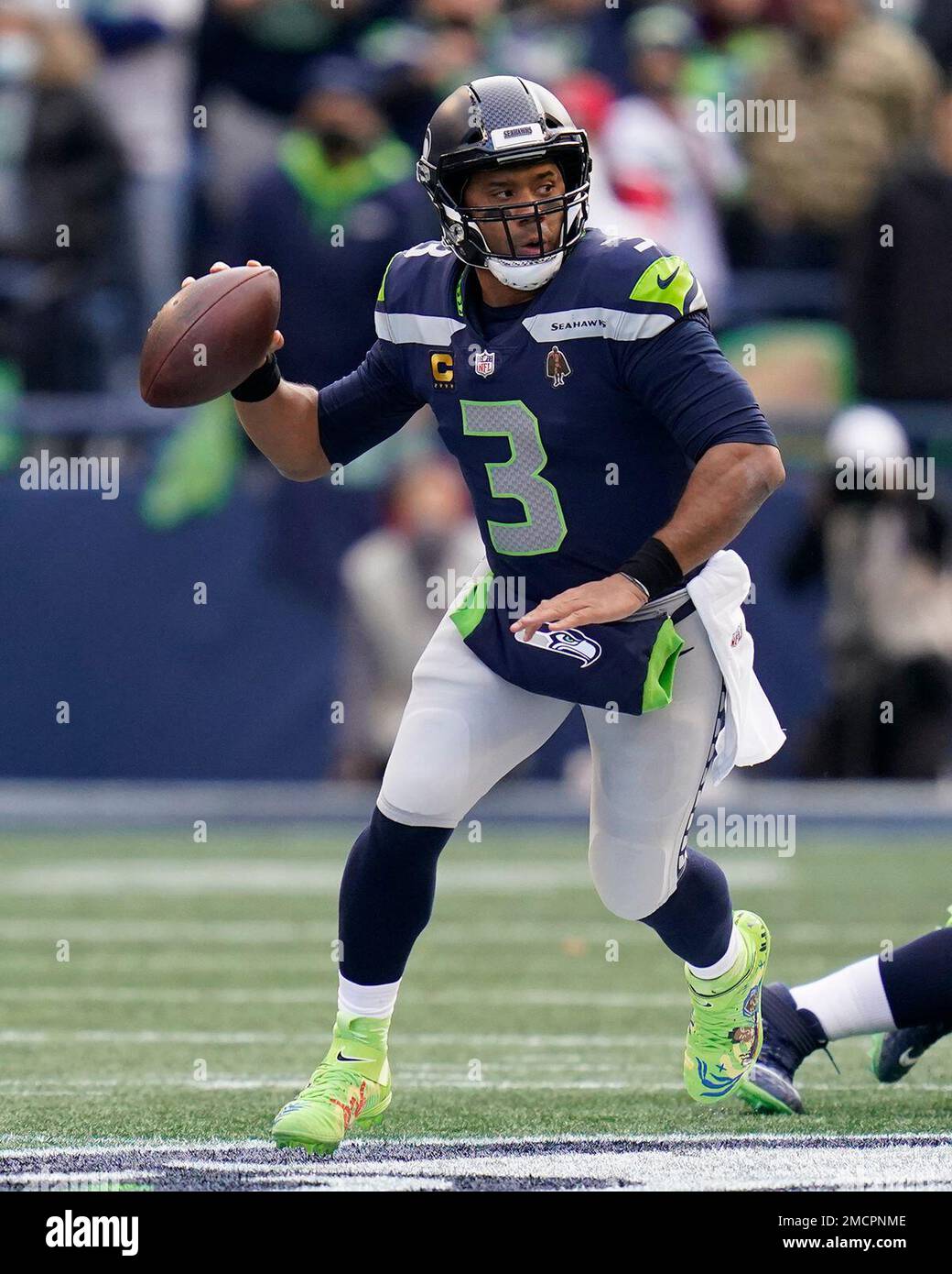 Seattle Seahawks quarterback Russell Wilson scrambles against the San ...