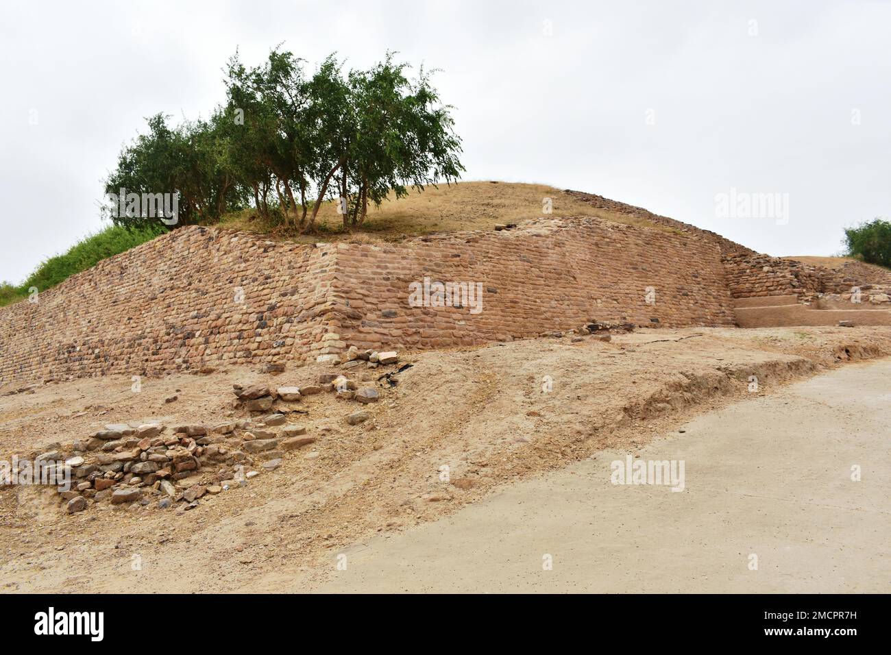 A landscape of a deserted valley with the remains of an ancient city ...