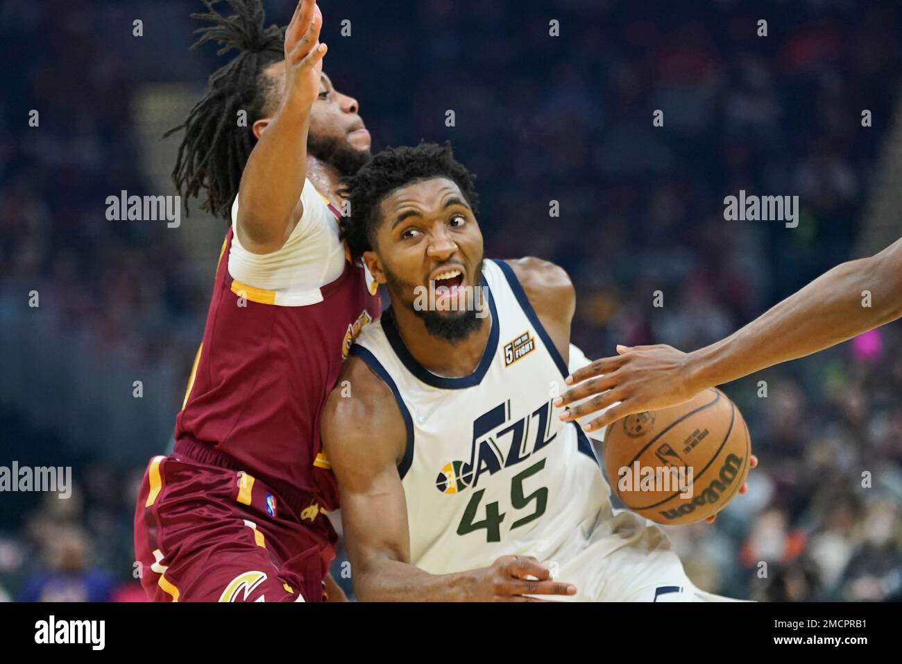 Utah Jazz's Donovan Mitchell (45) drives against Cleveland Cavaliers ...