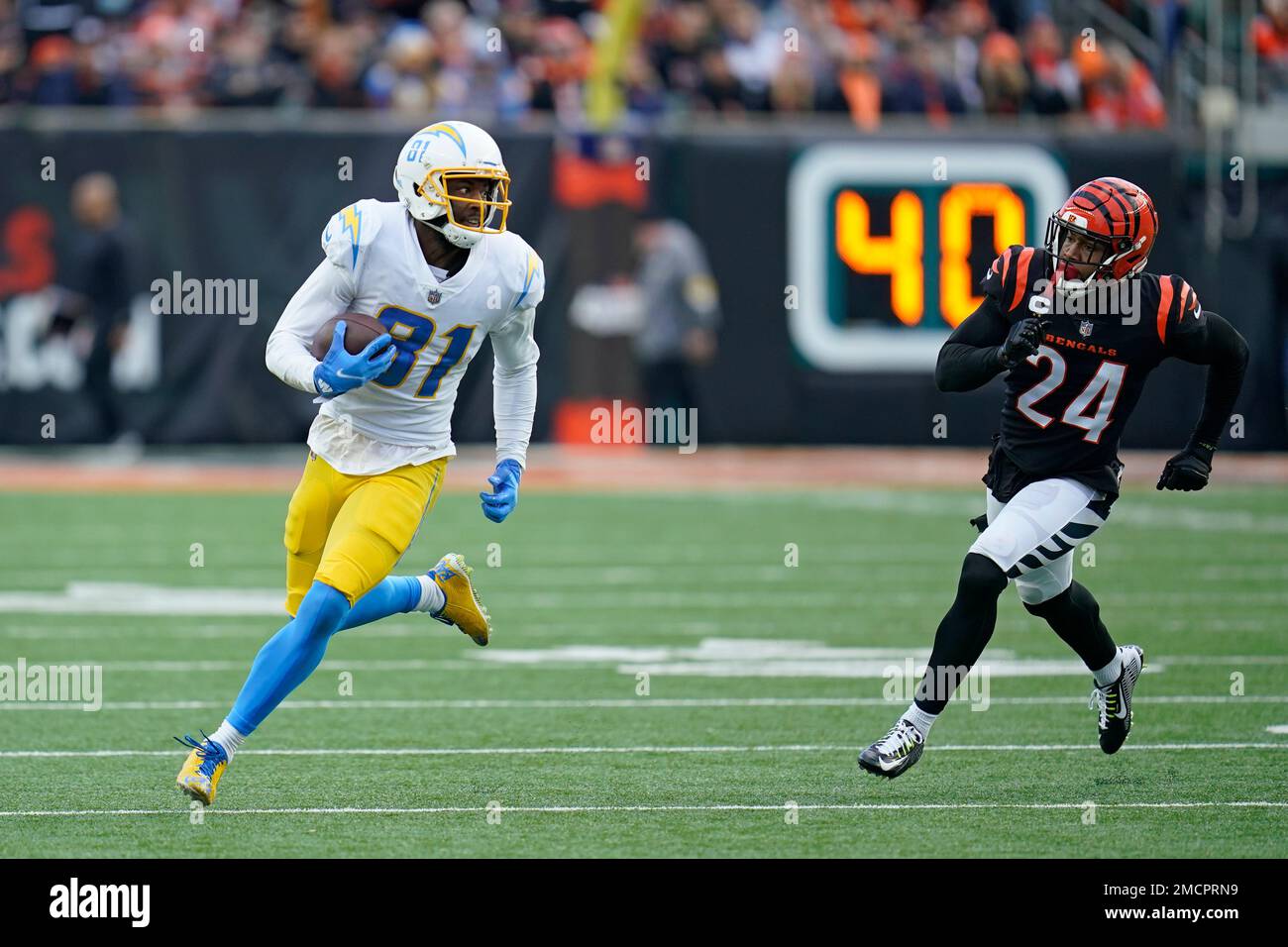 Los Angeles Chargers' Mike Williams (81) is chased by Cincinnati ...