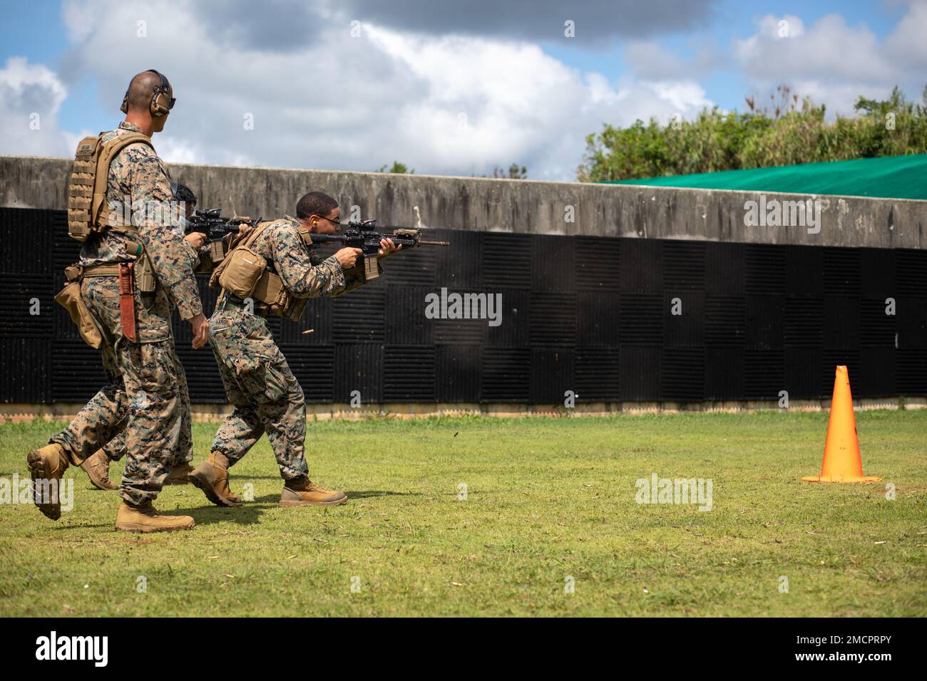 U.S. Marine Corps Staff Sgt. Dino Fruciano (left), an infantry unit ...