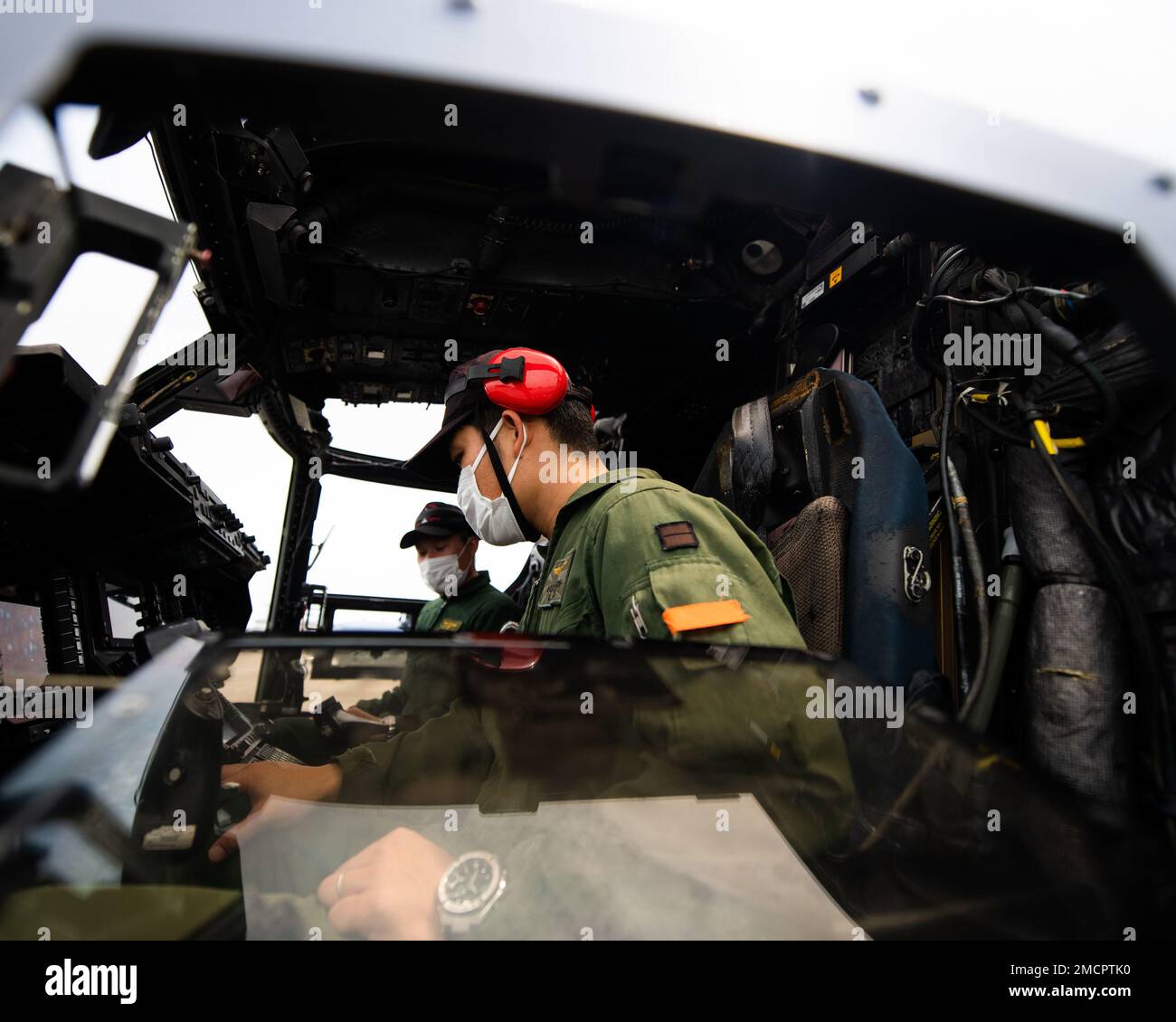 Members of the 71st Air Rescue Squadron tour the cockpit of a CV-22 ...