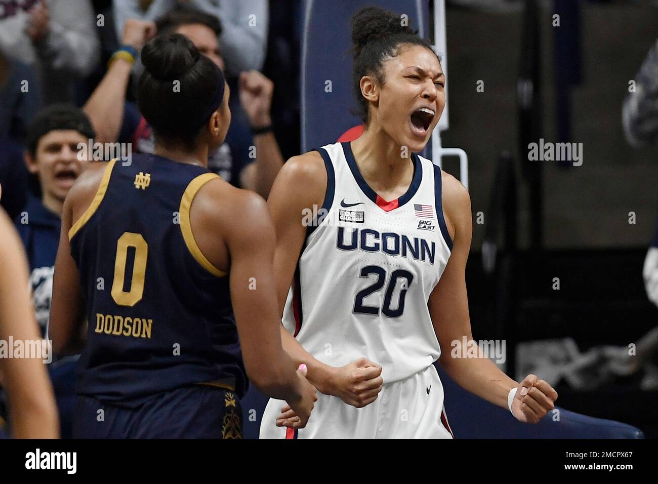 Connecticut's Olivia Nelson-Ododa (20) reacts after making a basket ...