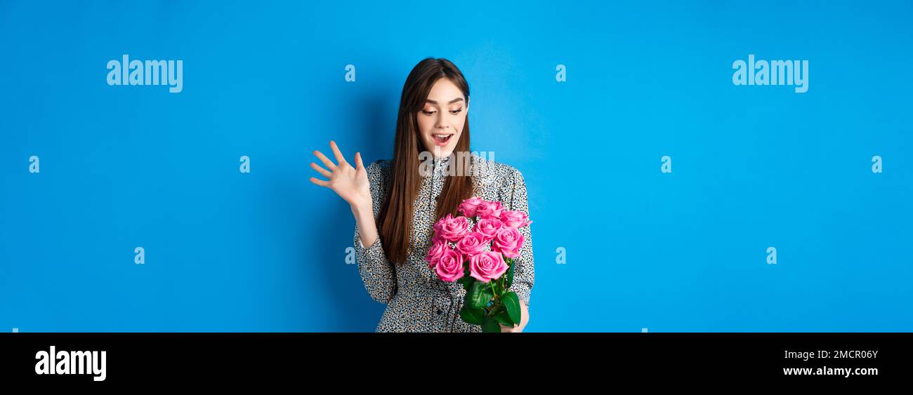 Valentines day concept. Image of attractive young woman gasping amazed ...